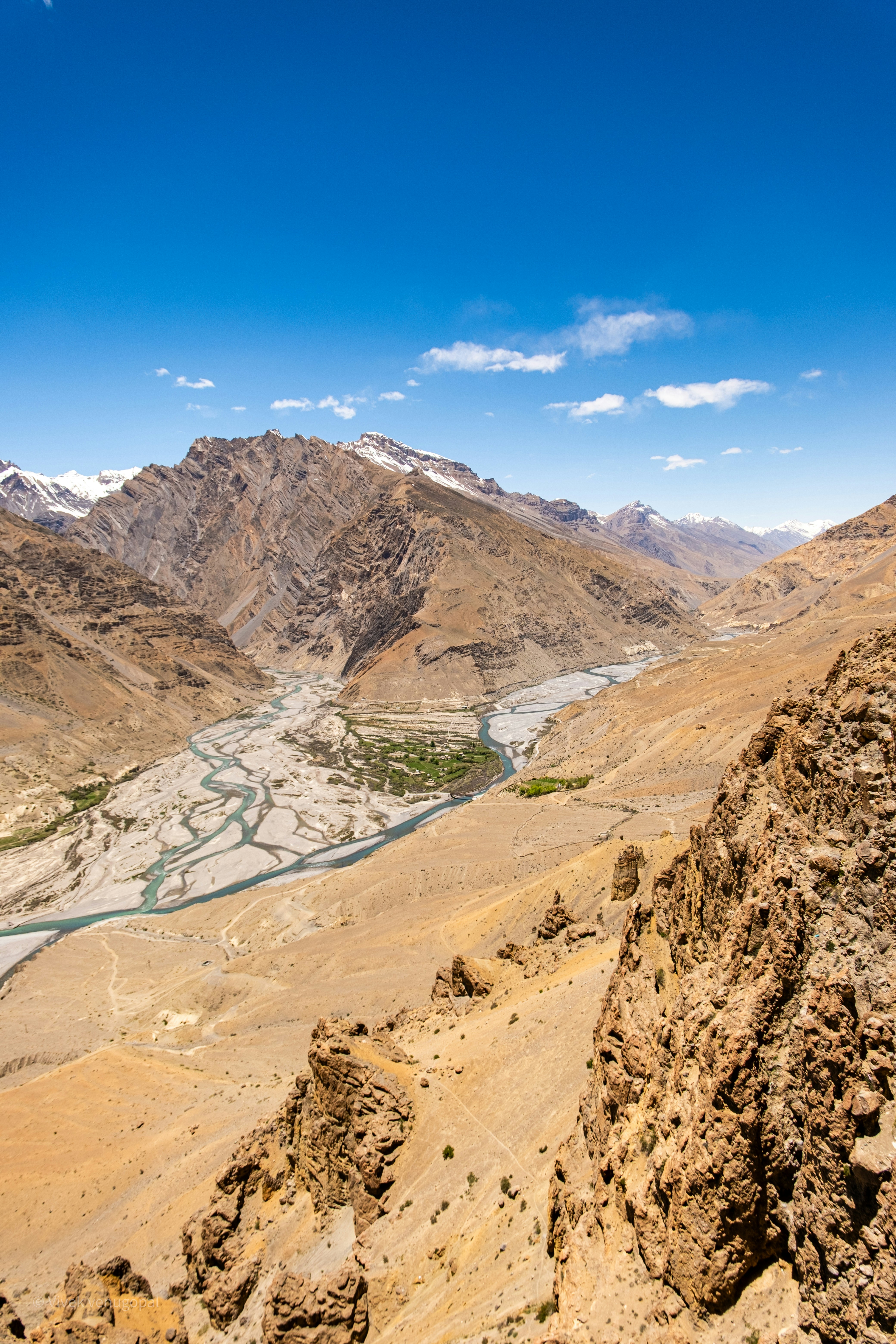 Desert Valleys Carved by Rivers Under a Sharp Alpine Sky