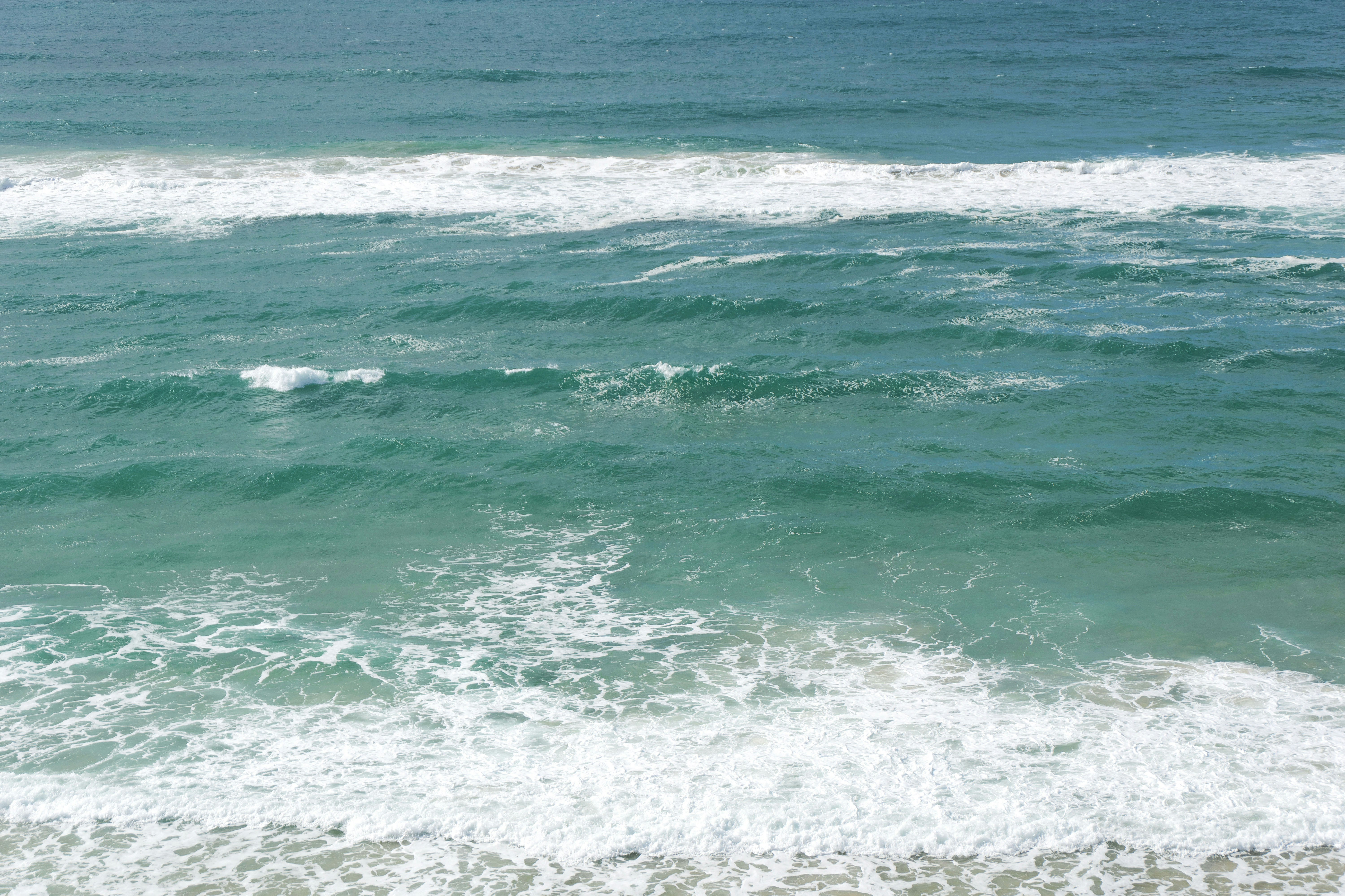 Coastal Gradient: Turquoise to Foam on a Quiet Shore