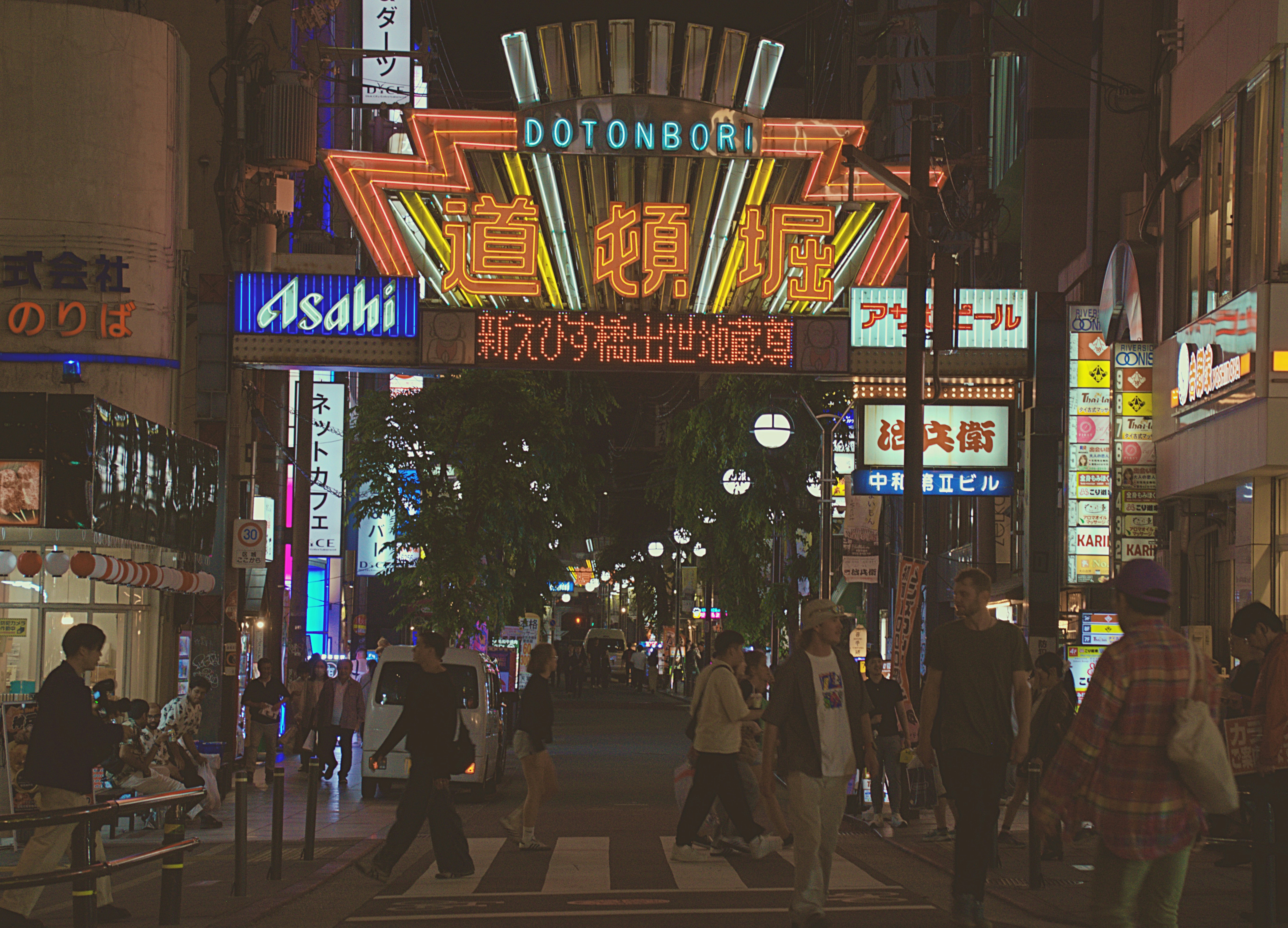 Neon Crossing: Tokyo-Style Night on a Busy Pedestrian Lane