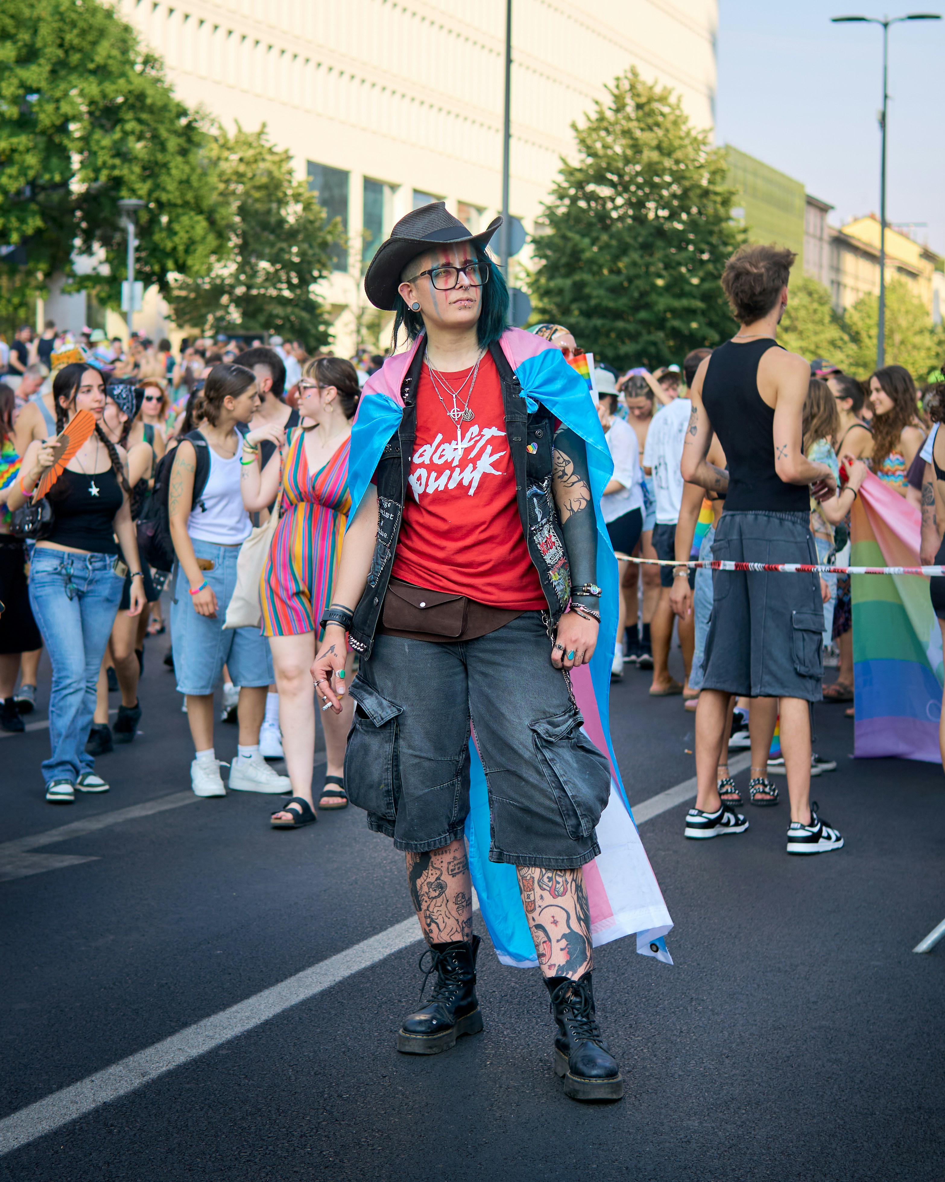 Center Stage: The Rainbow-Clad Leader in a Sea of Pride