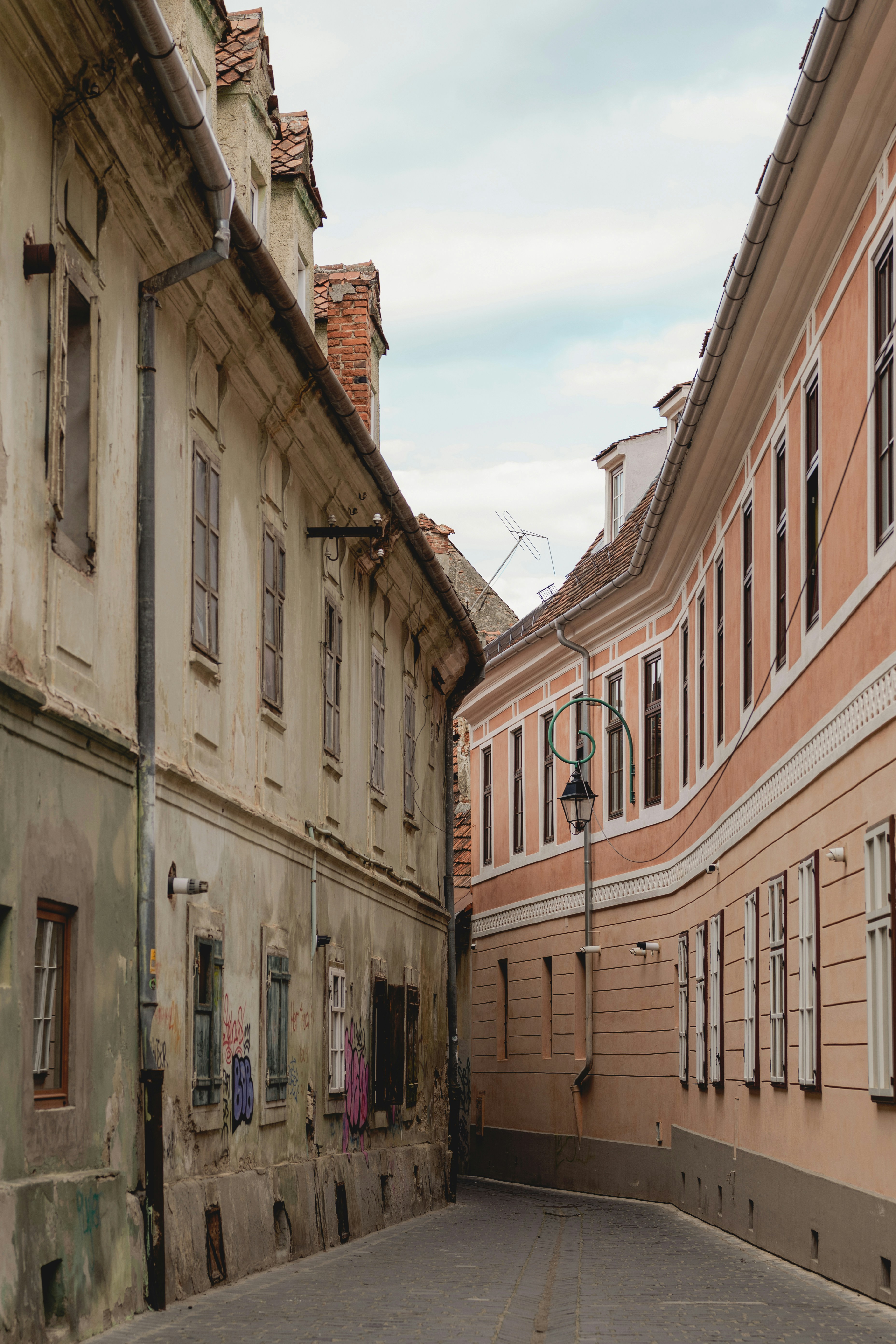 Narrow European Lane with Contrasting Facades
