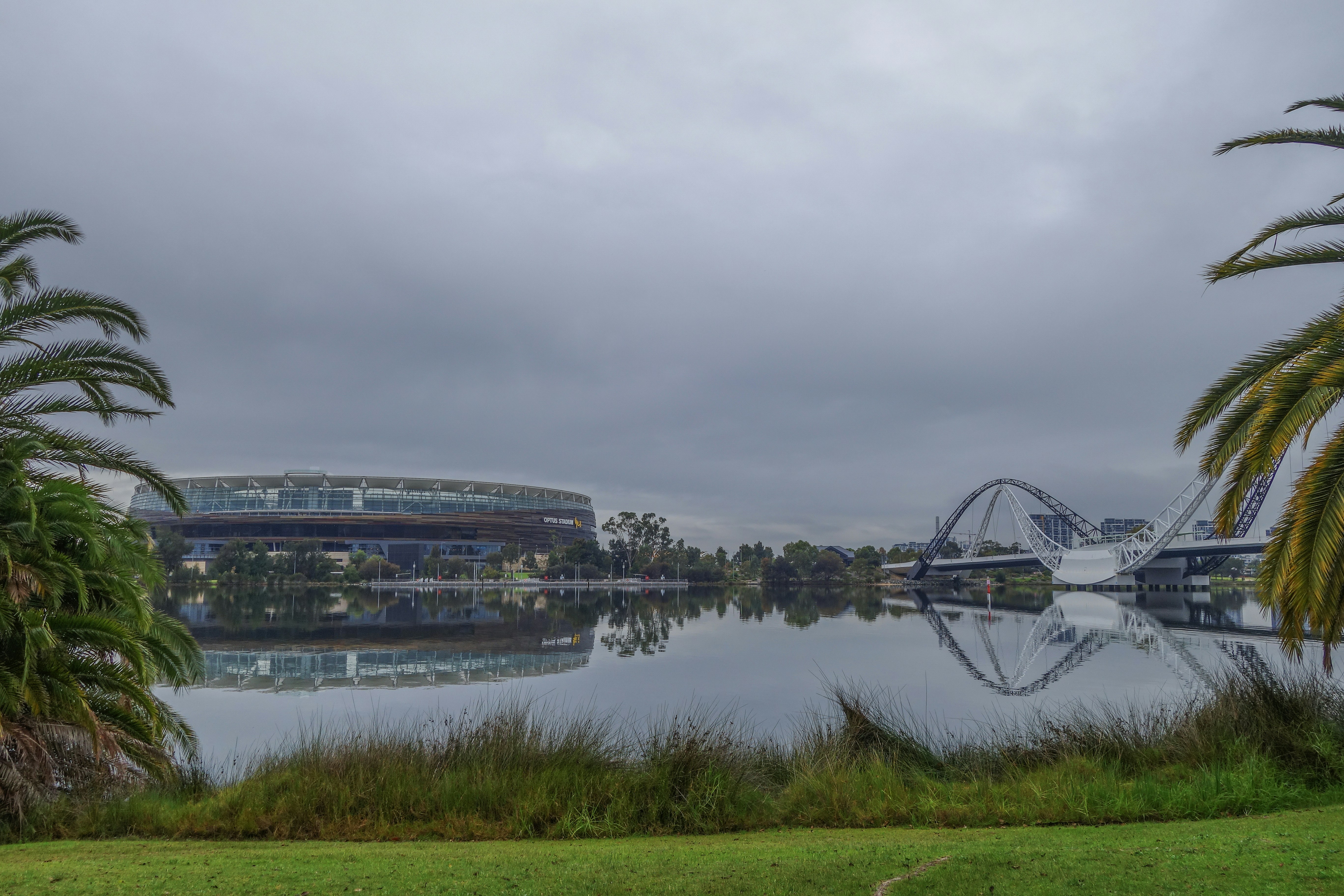 Glassy Lake, Modern Arc—A Riverside Mirror