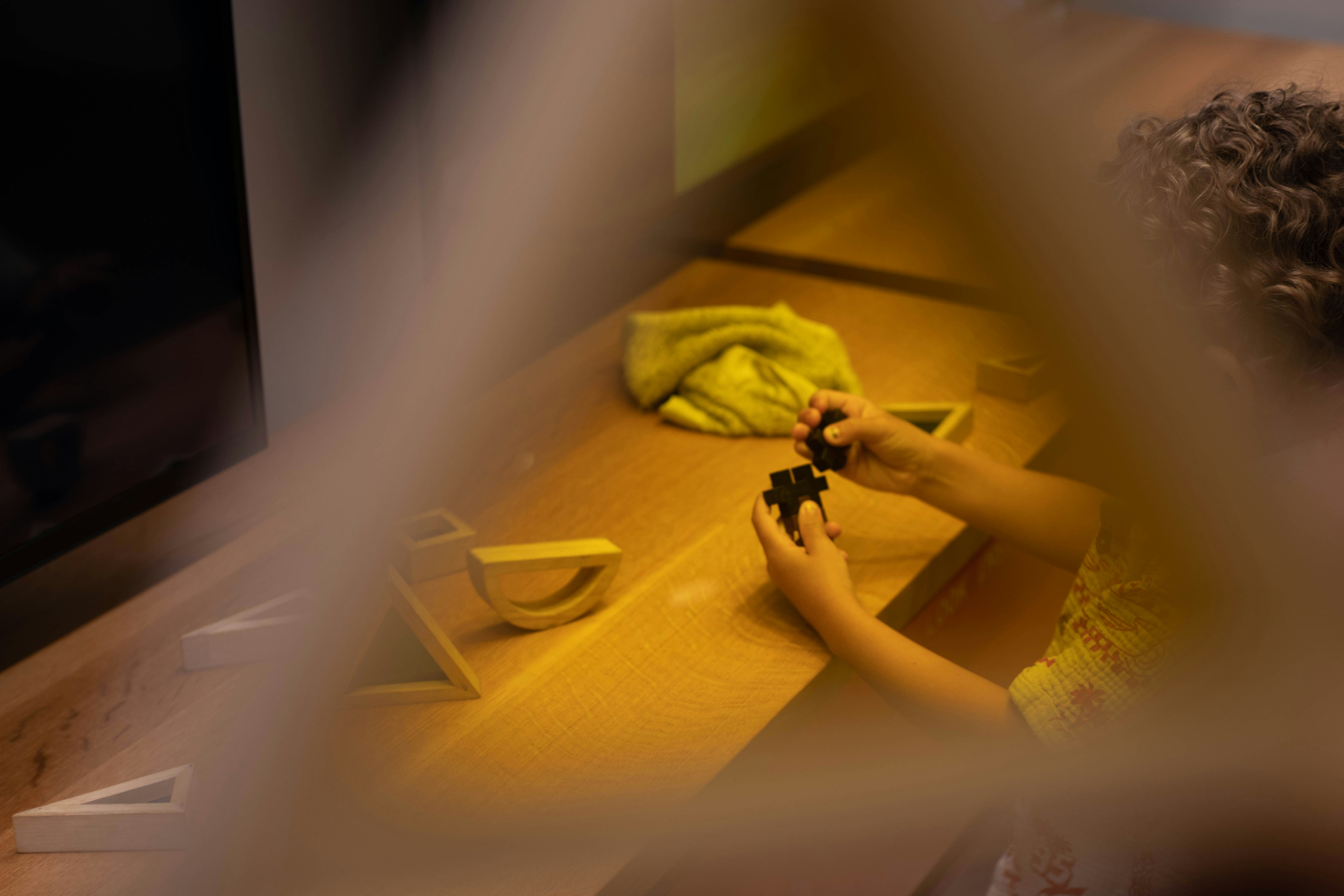 Soft Focus at the Kitchen Counter: A Child’s Play with a Toy