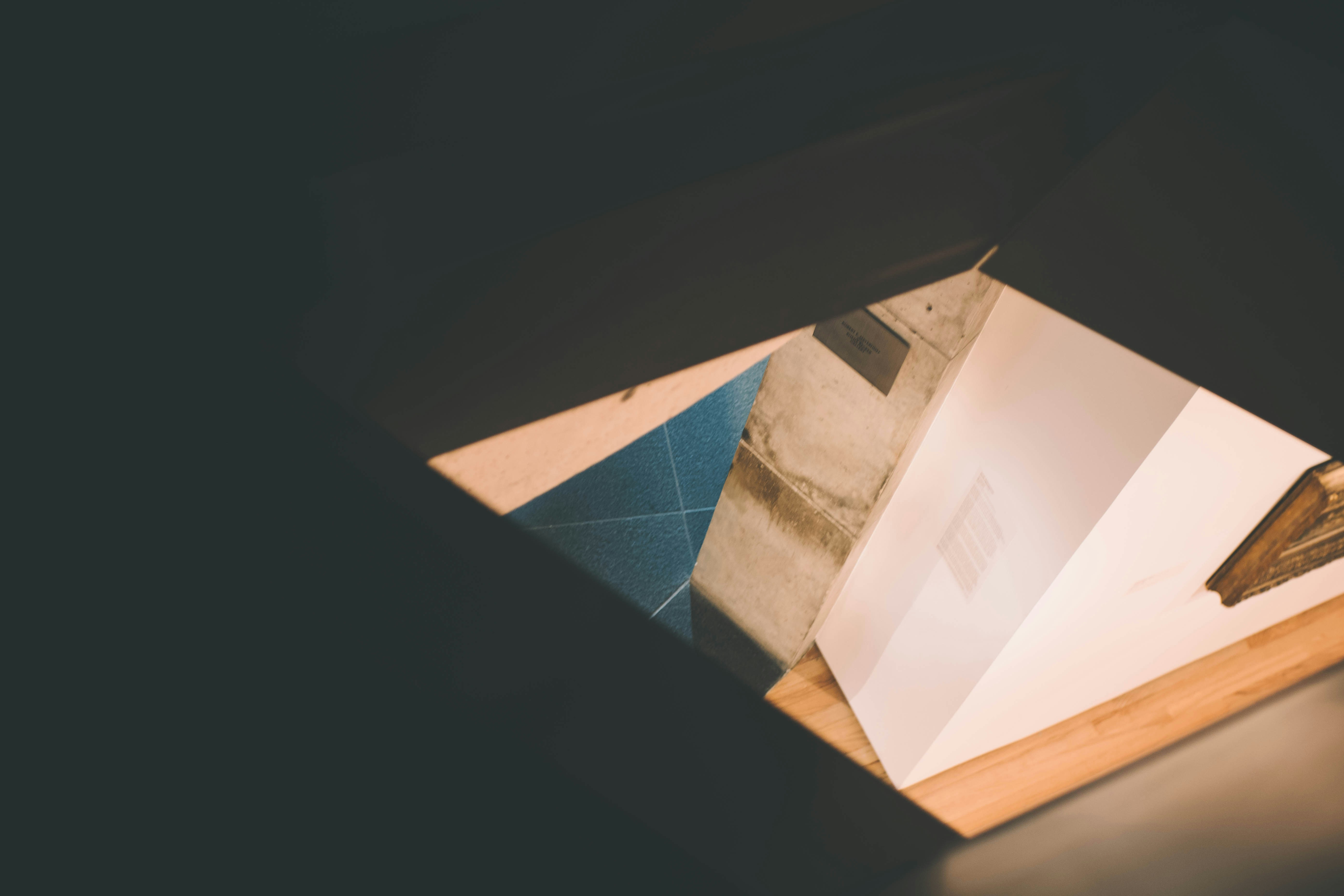 Through a Narrow Vignette: A Hidden Corridor Angled into Light