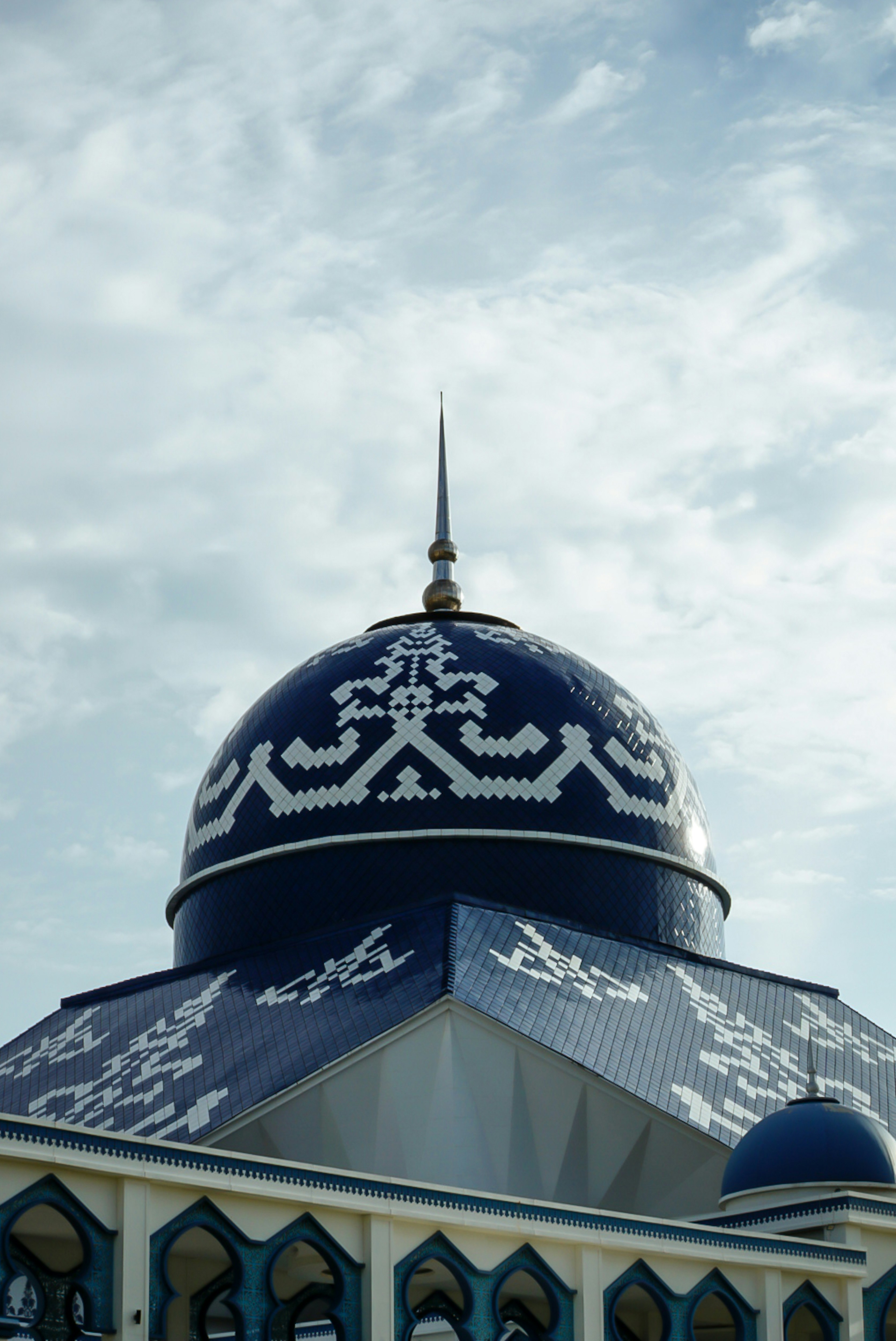 Blue Dome Silhouette: A Spire Reaches Toward the Sky