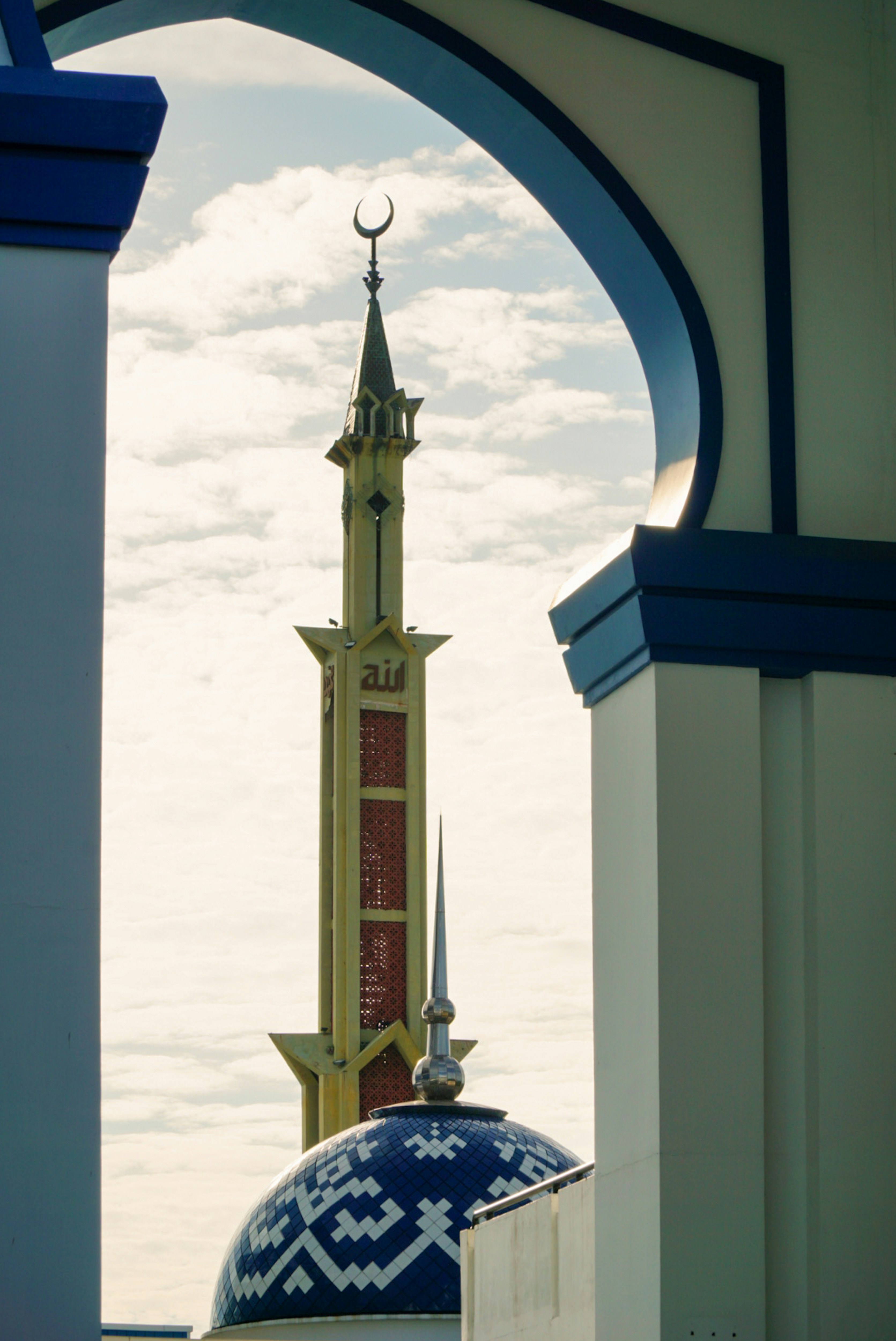 Archway Framing the Mosque Minaret