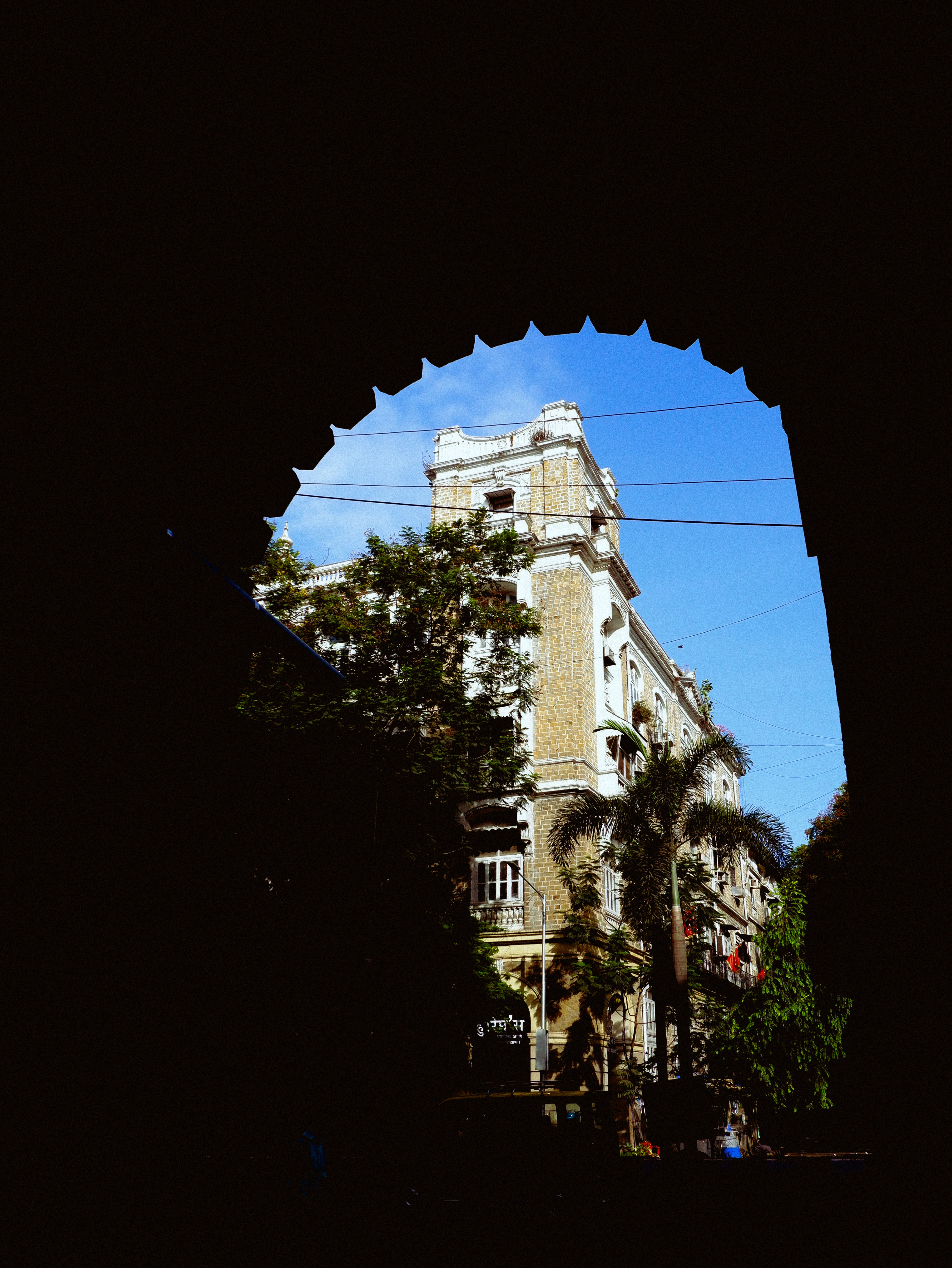 Lighted Archway: A Street View Framed by Shadow