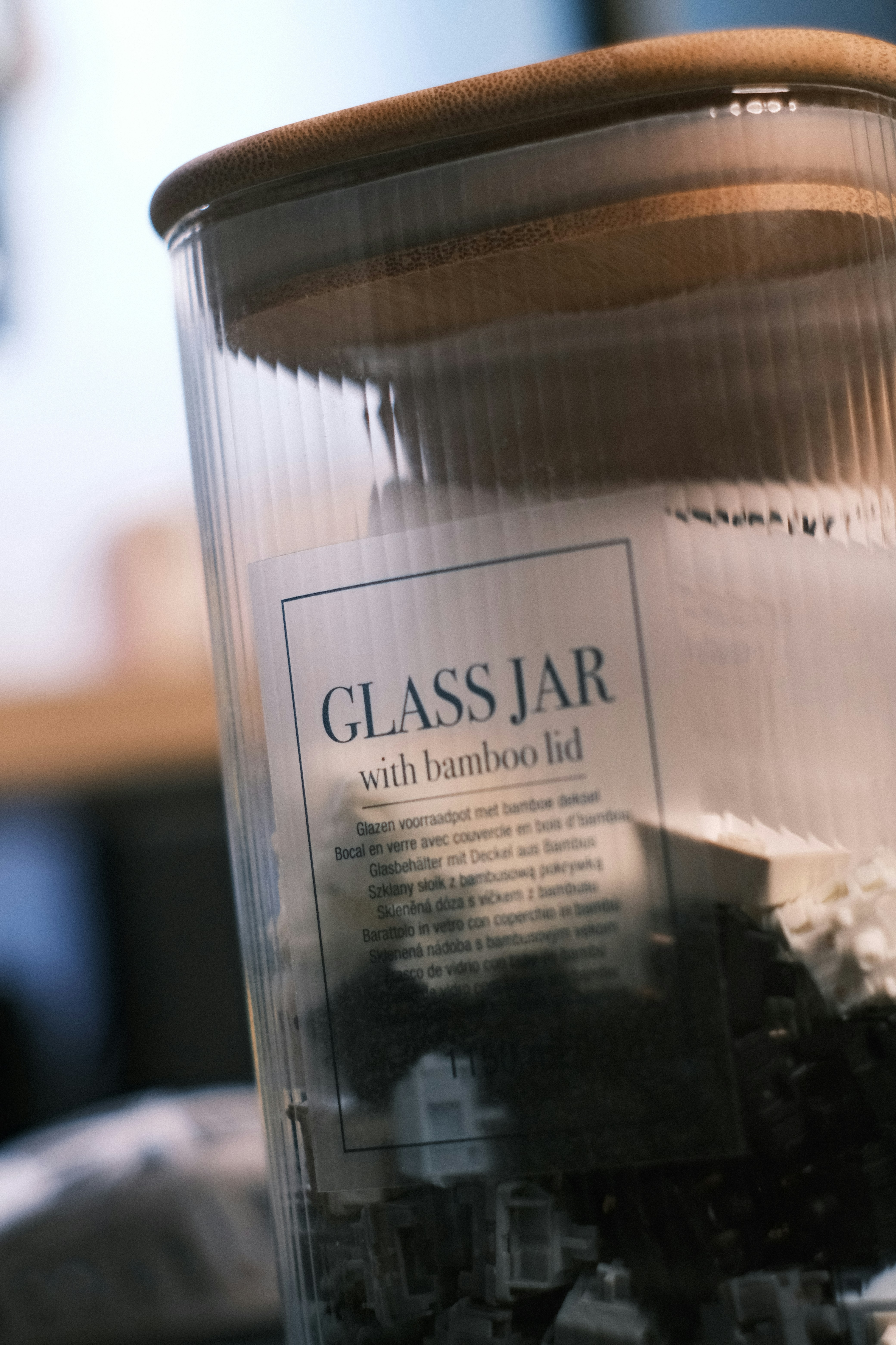 Glass Jar Portrait: A Close-Up of Clarity Through Curved Glass