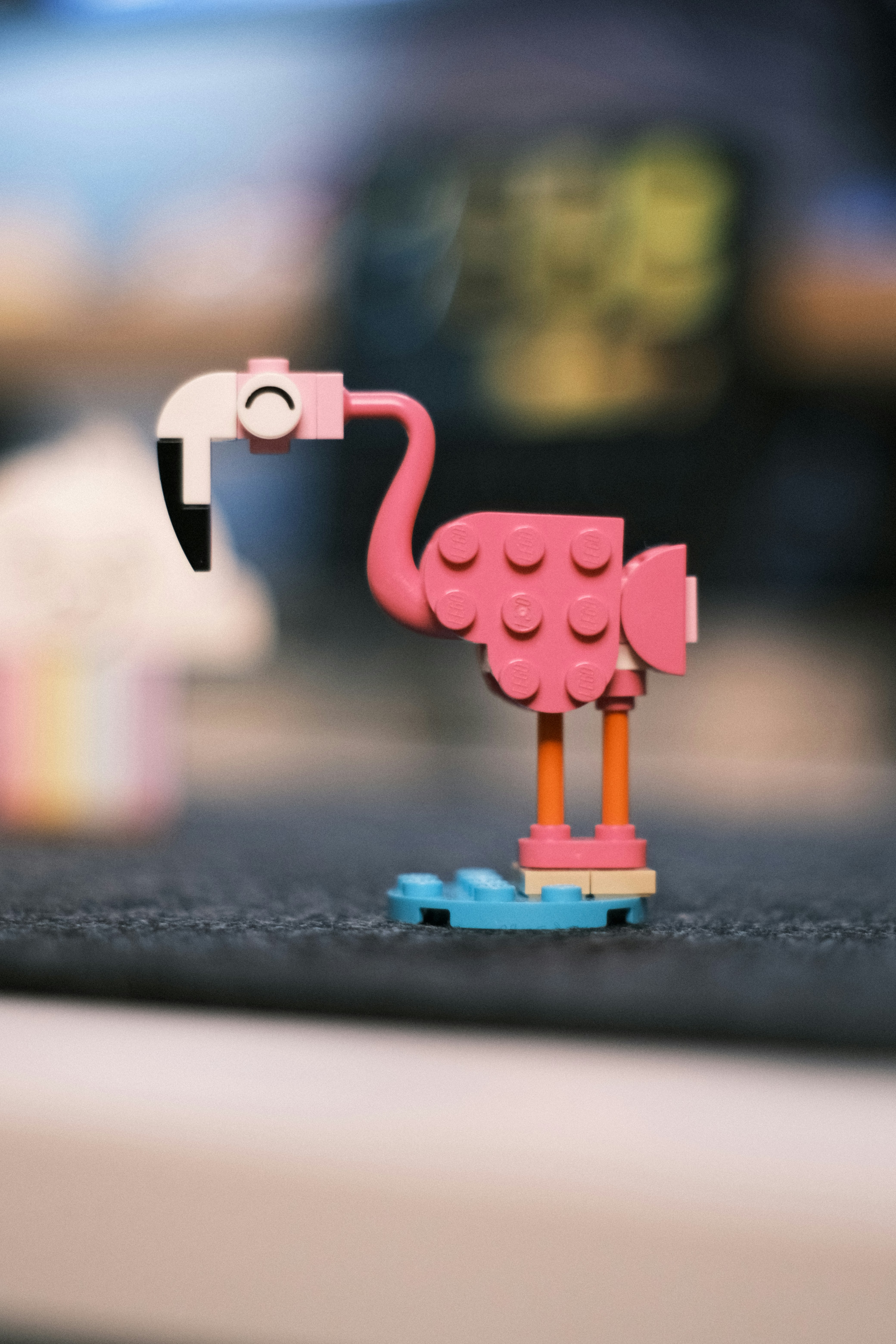 Pink LEGO Flamingo on a Tiny Blue Pedestal