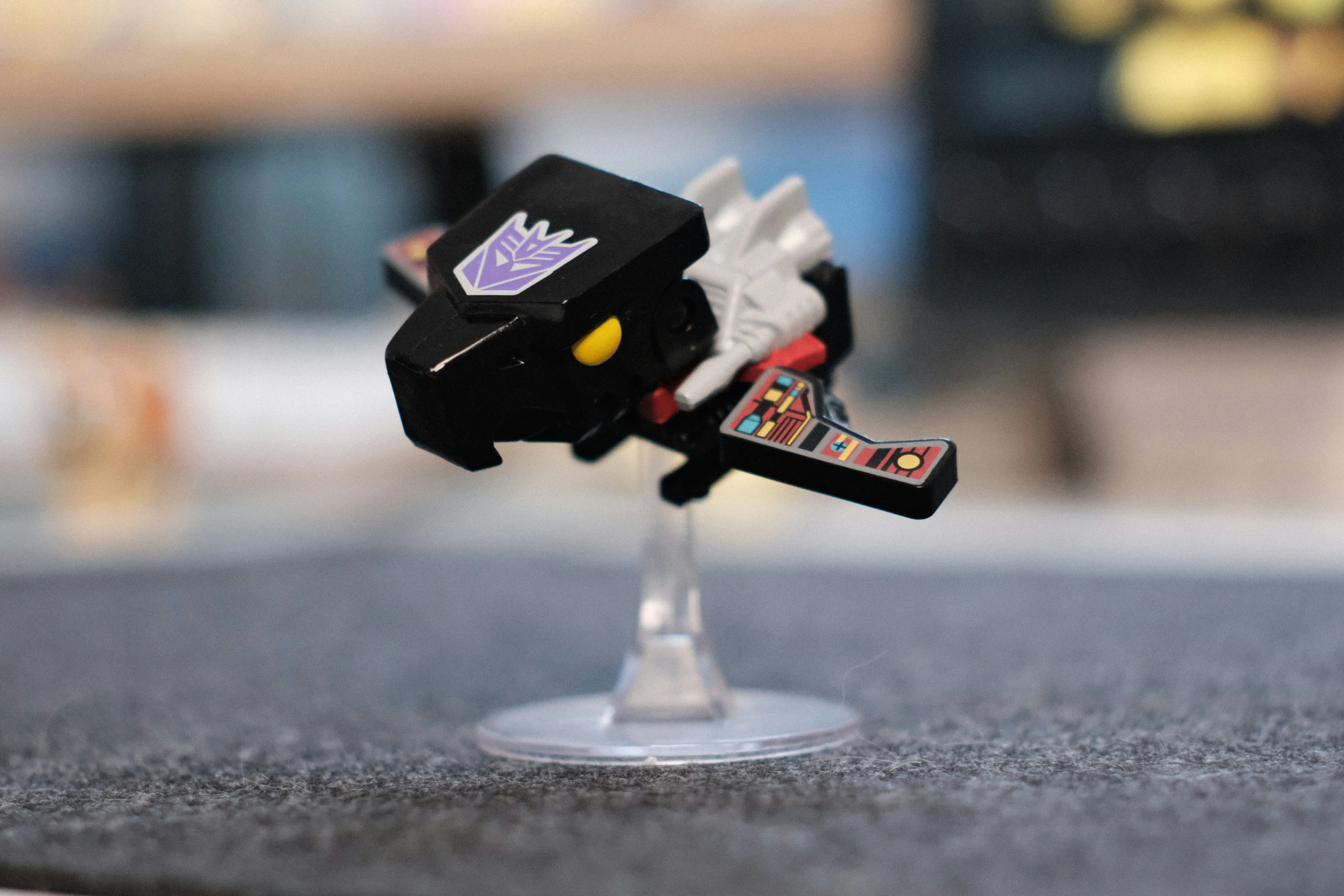 Micro-Transformer on a Clear Stand: A Tiny Hero in Focus