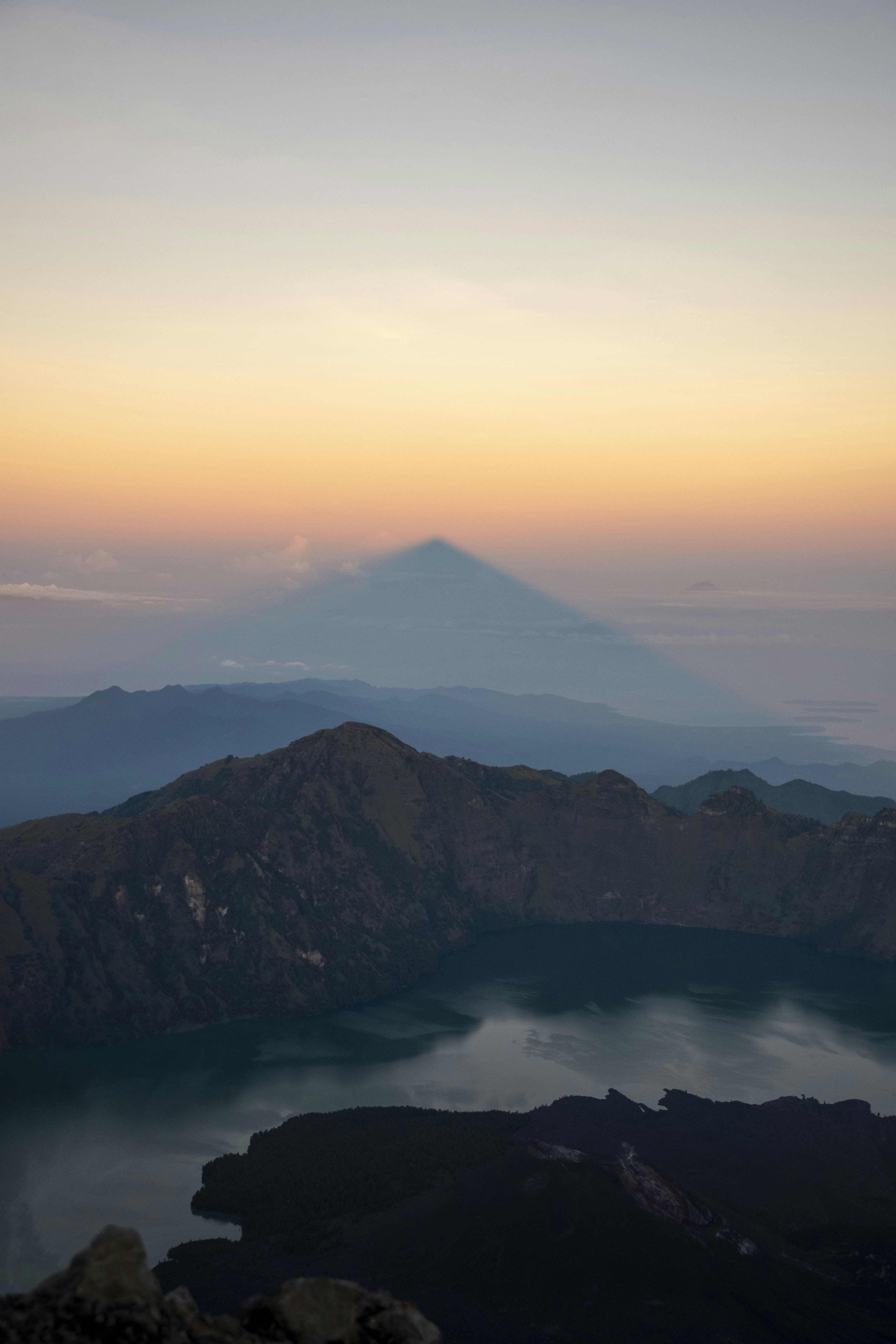 Shadowed Peak: A Pyramid Silhouette Crossing the Dusk