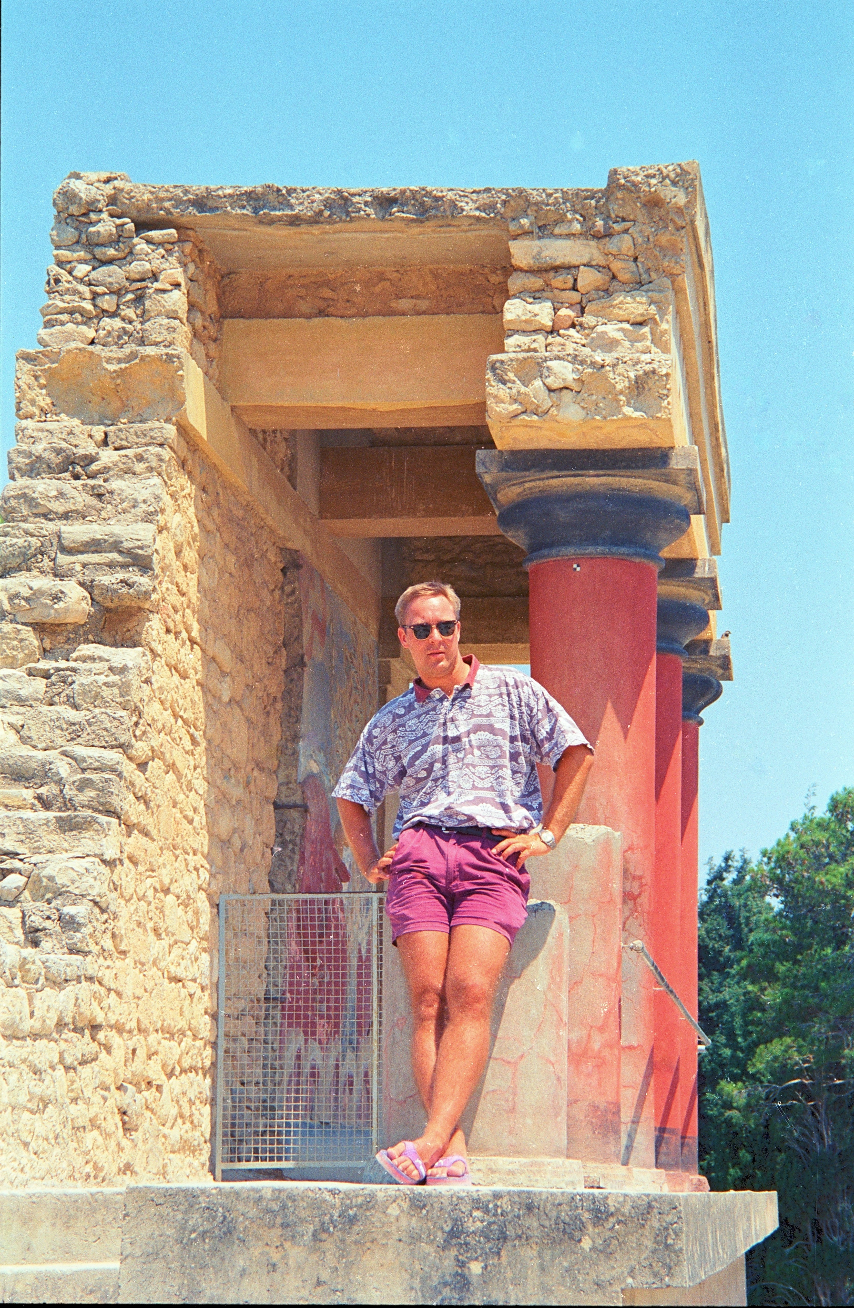 Sunlit Explorer Stance at Ancient Portico