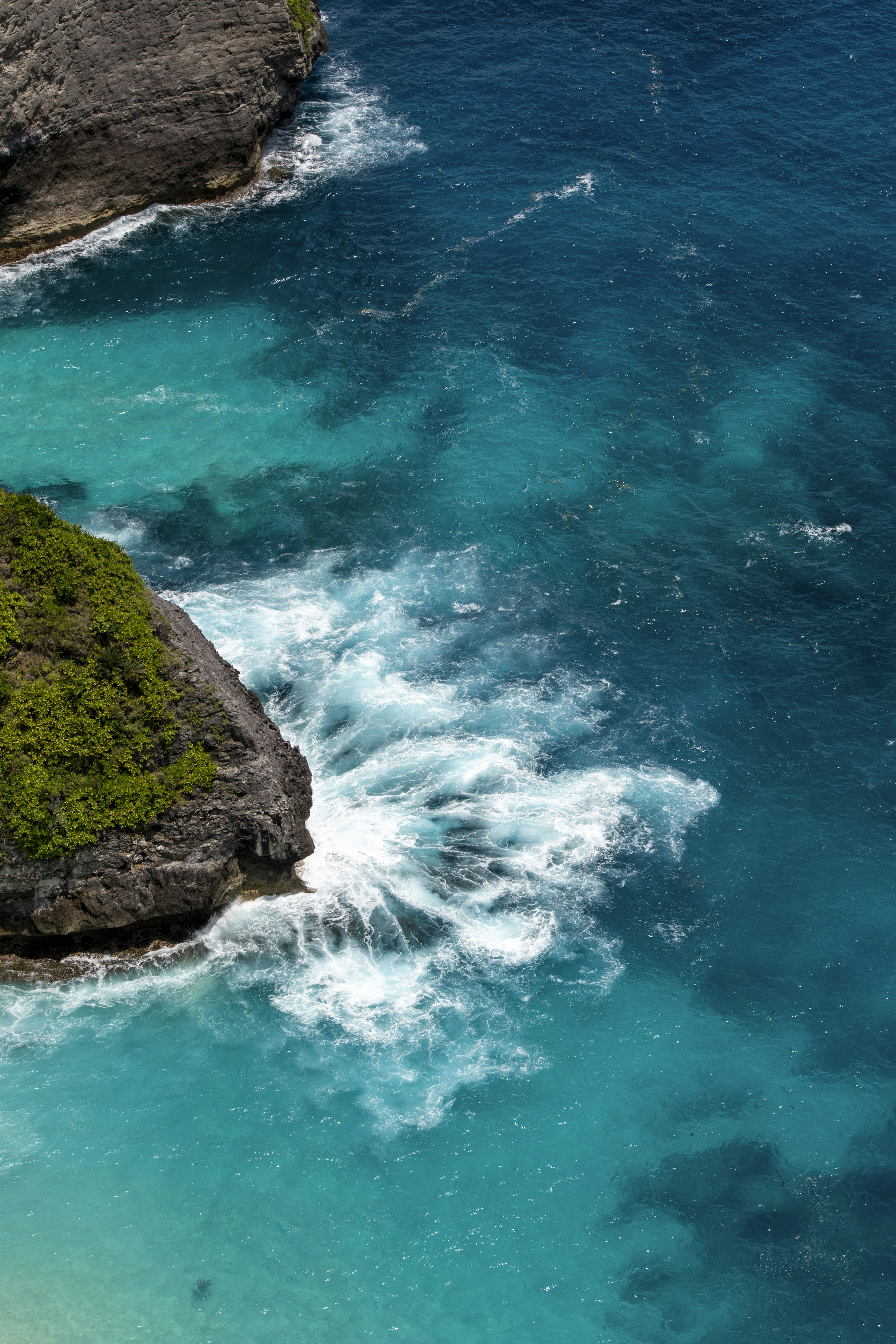 Emerald Verge: Ocean Crest Colliding with Verdant Cliff