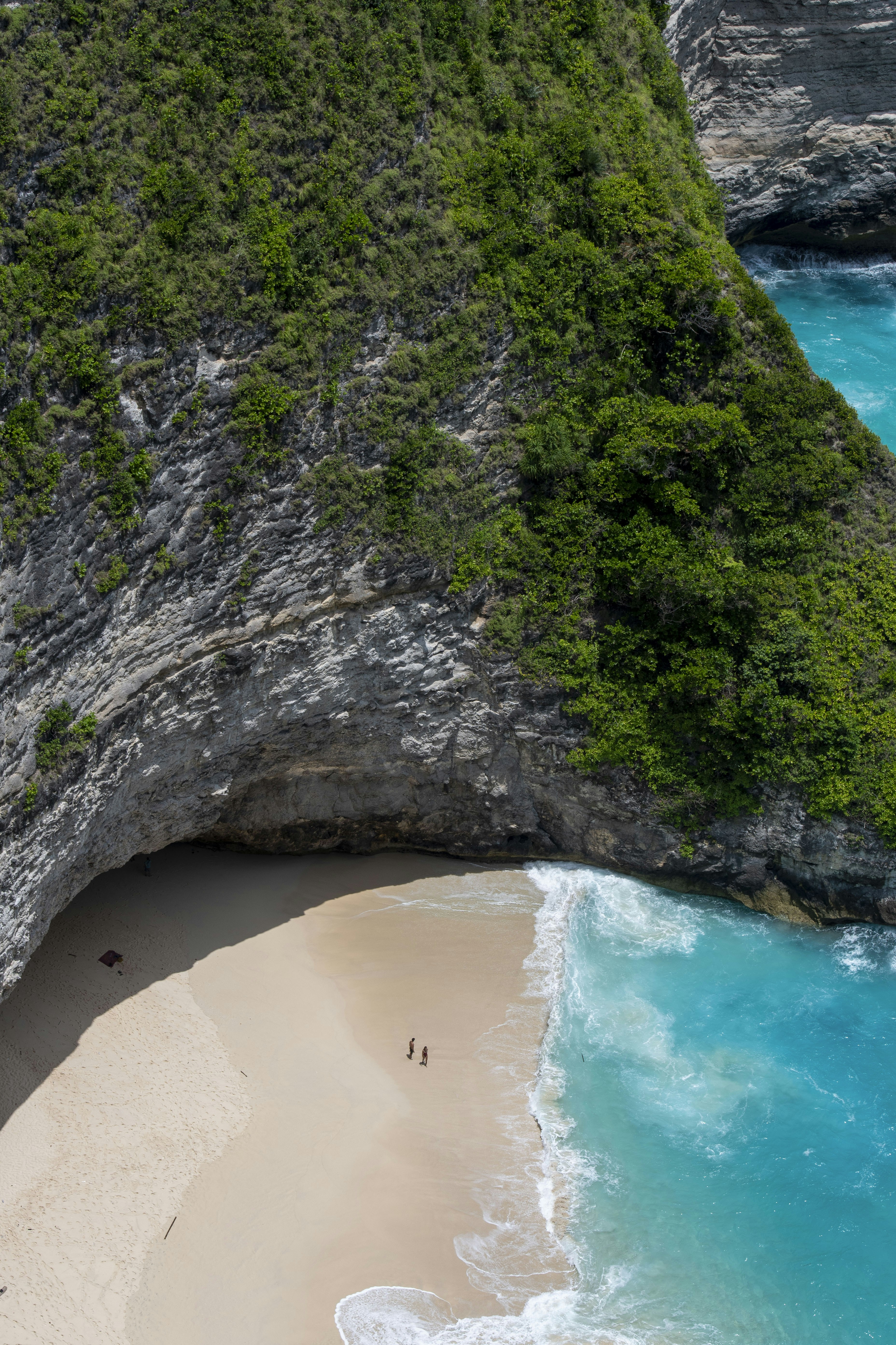 Turquoise Cove Between Verdant Cliffs