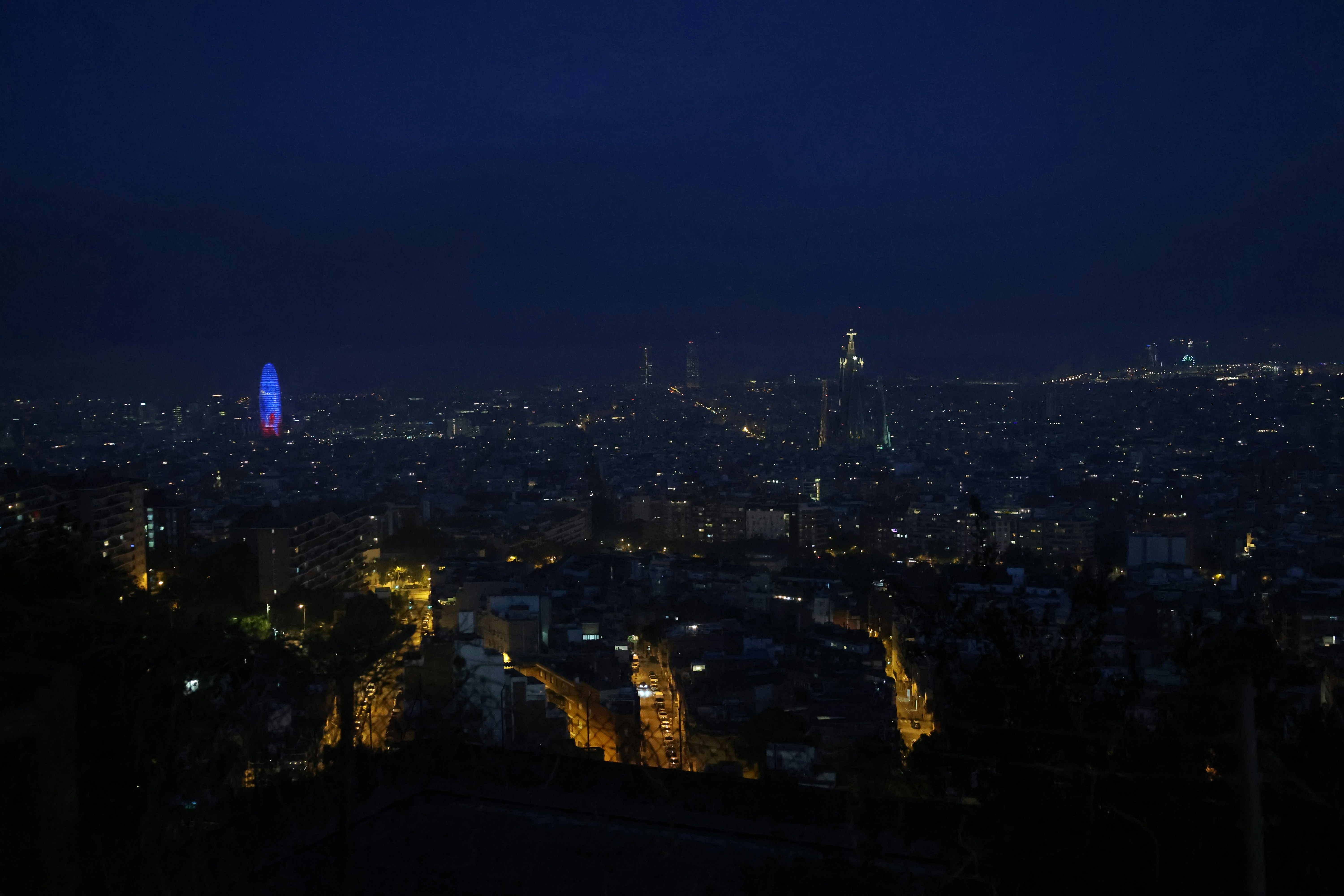 City Lights at Dusk: A Quiet Night Over the Hills