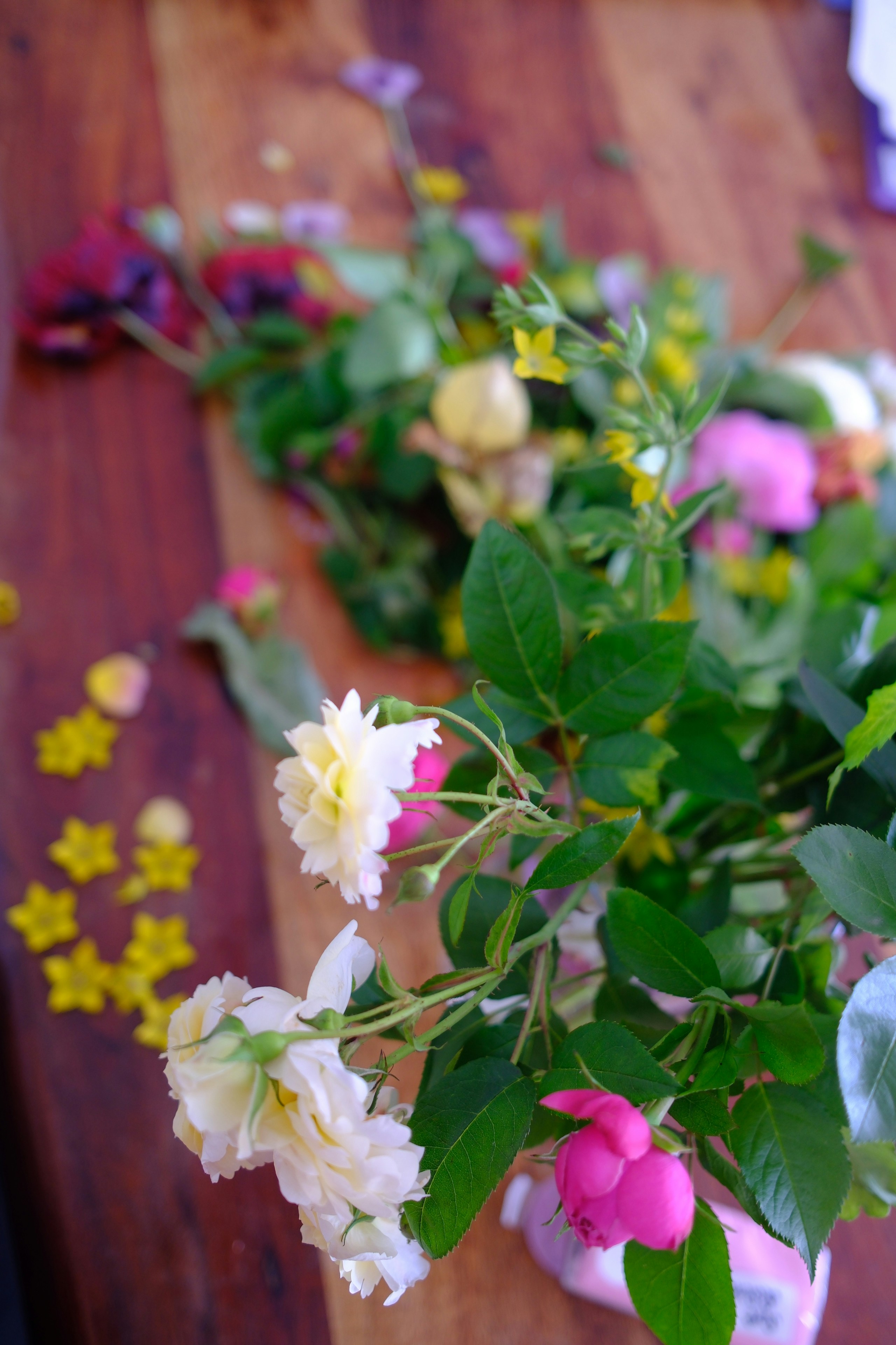 Soft-focus Floral Cascade in Warm Wood Studio