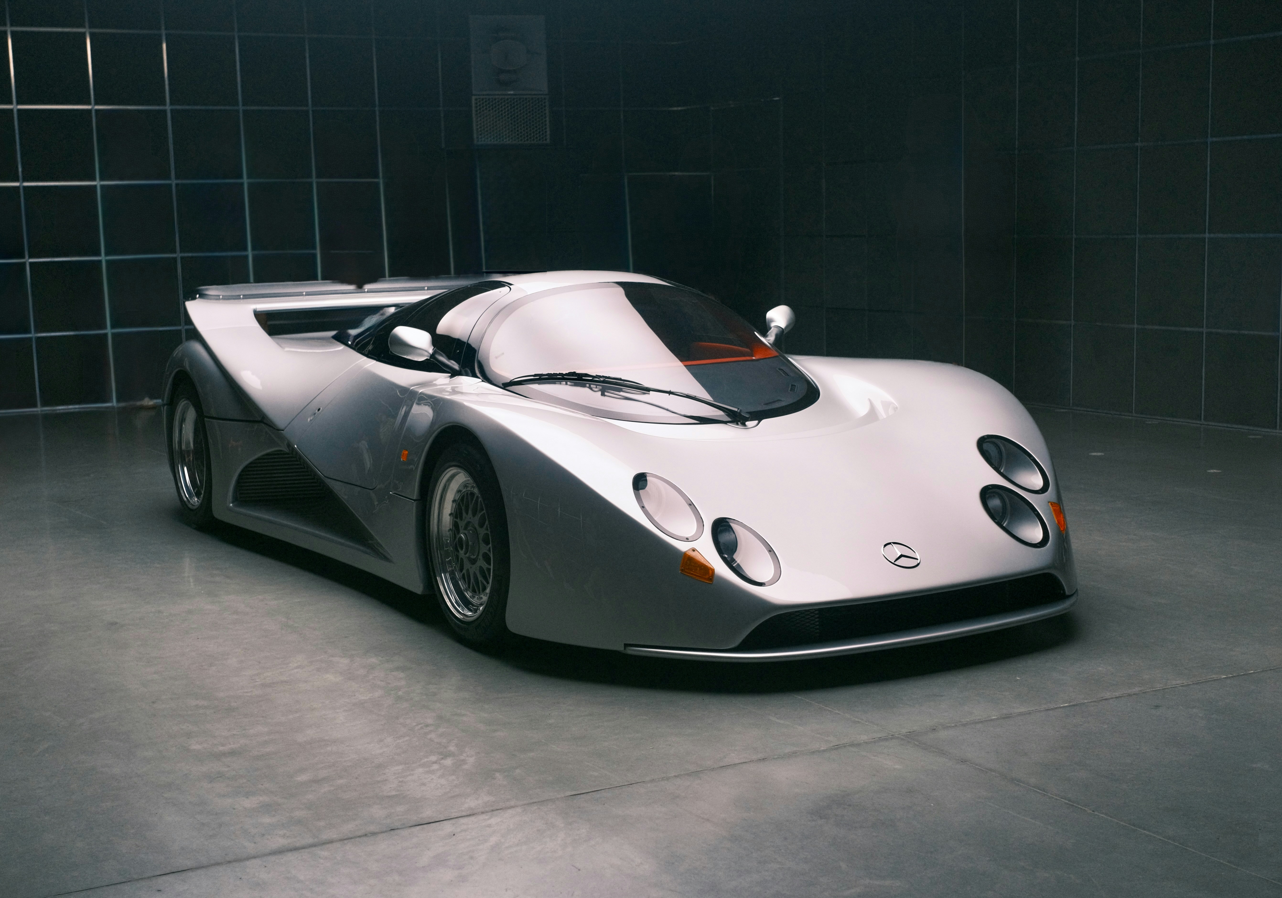 Silvery Hypercar in a Quiet Studio