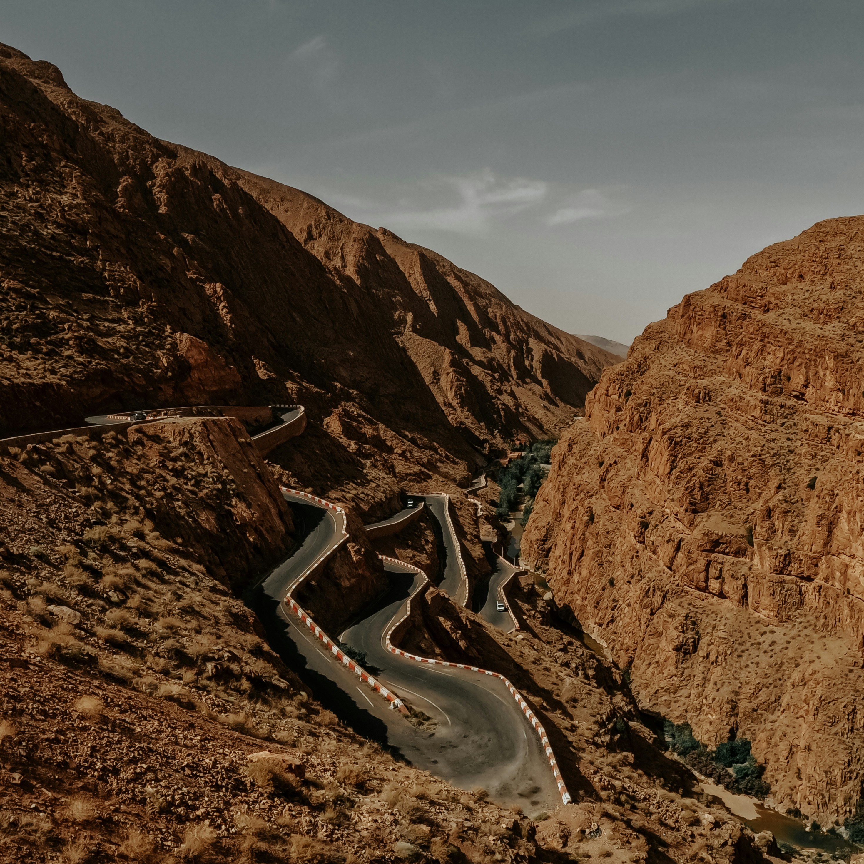 Serpentine Pass: A Desert Mountain Road Winding Through Red Cliffs