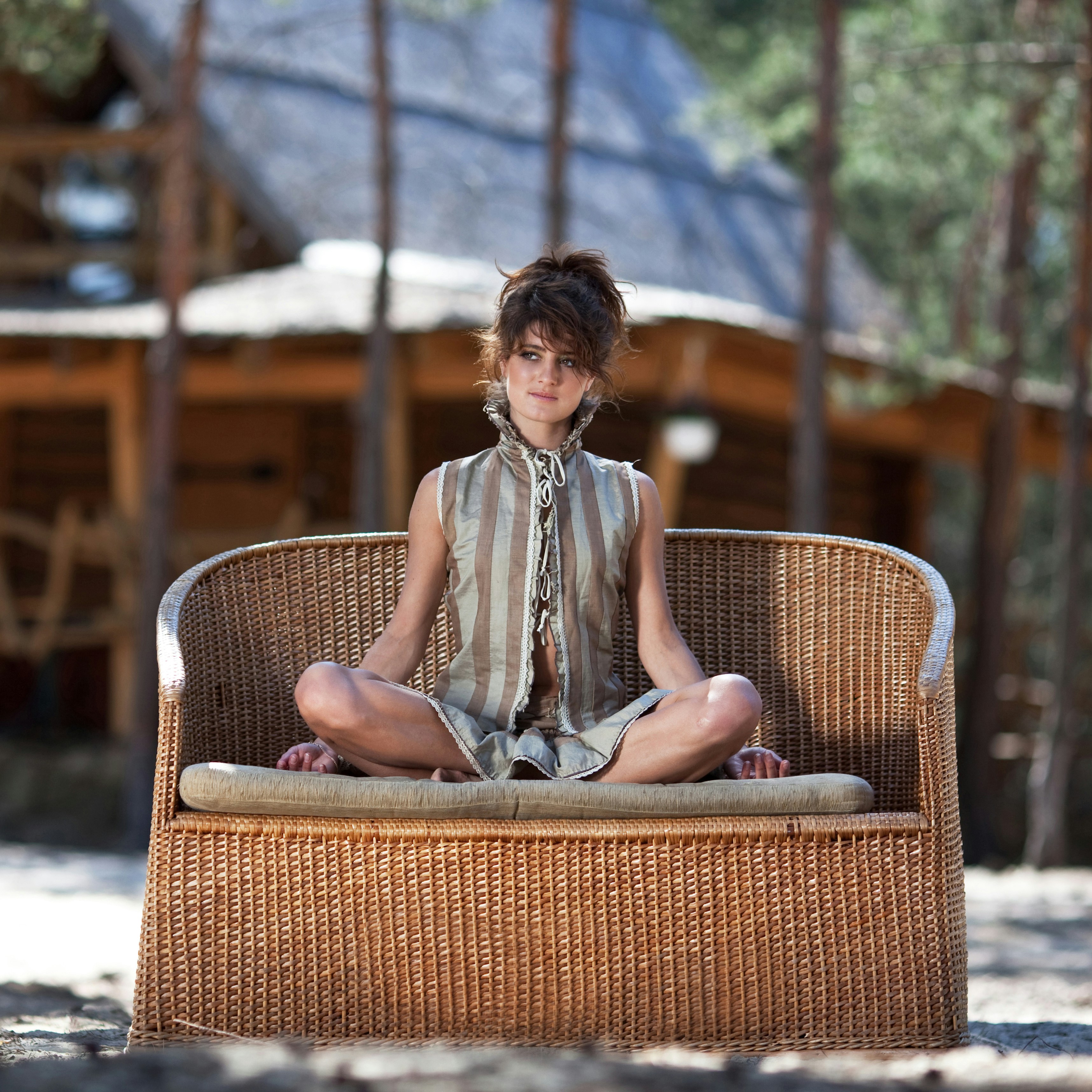 Quiet Center: A Meditative Moment on a Wicker Bench
