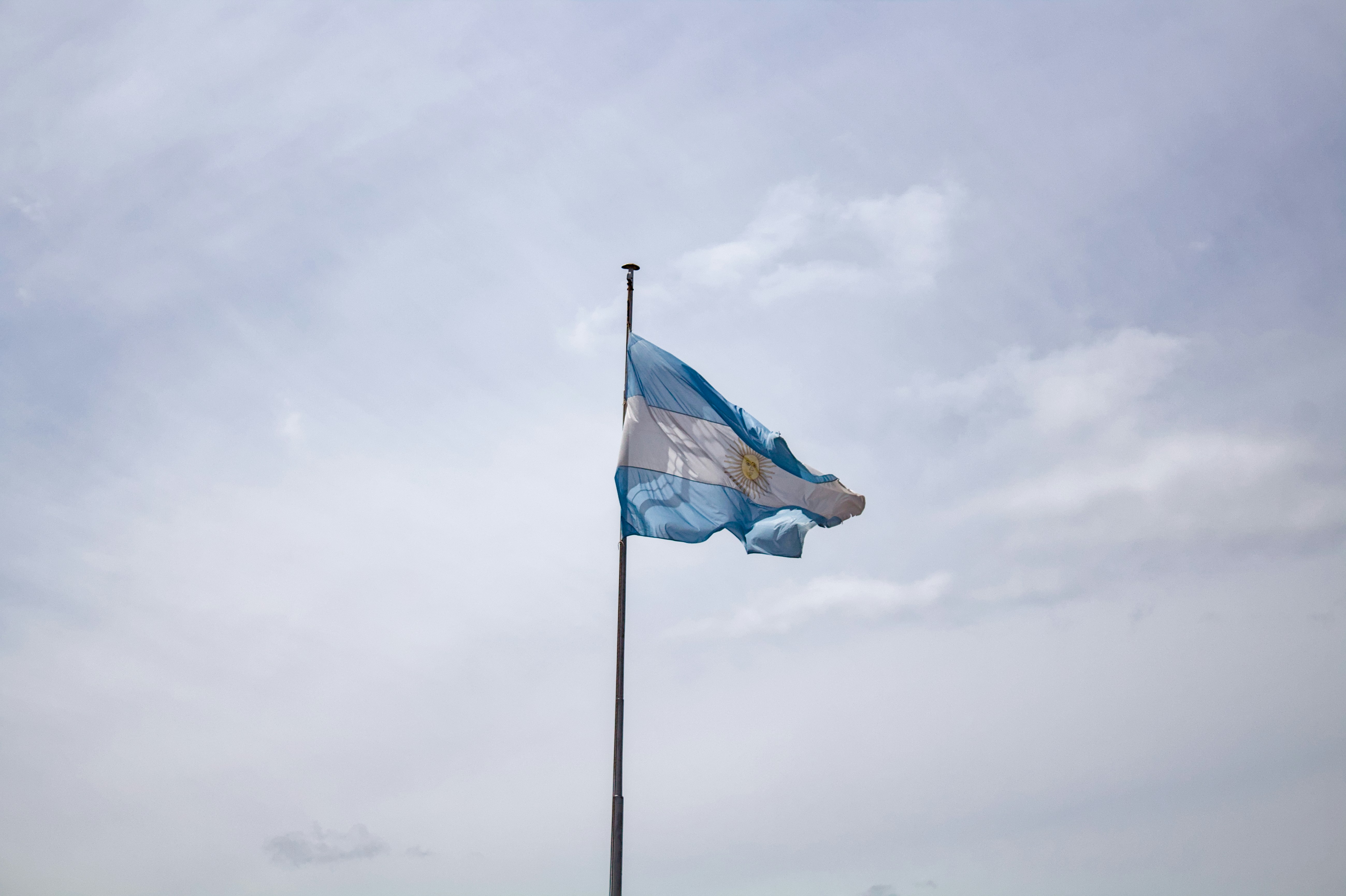 Flag on a Sky-Soaked Pole