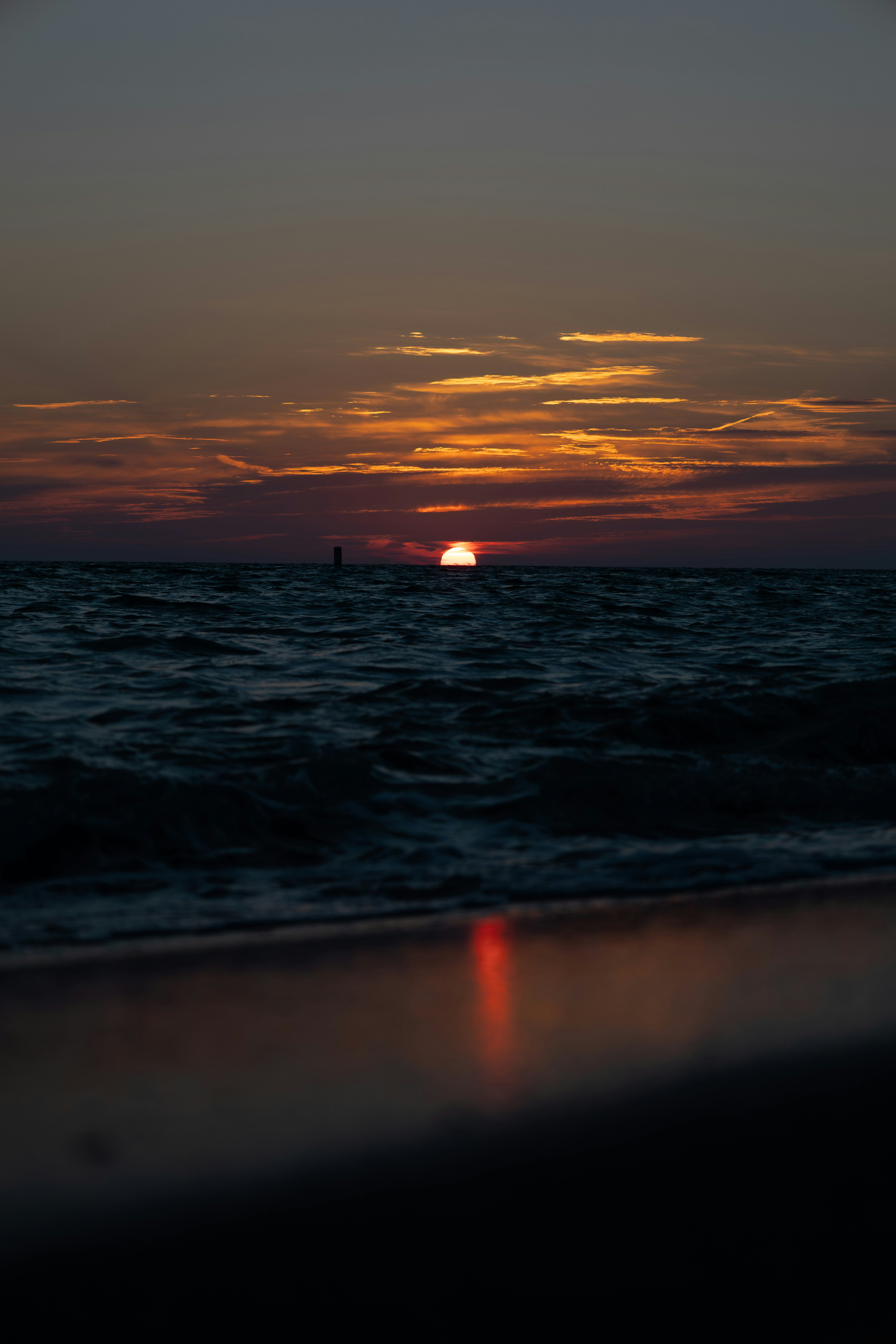Sunlit Horizon: The Quiet Return of Day to Sea