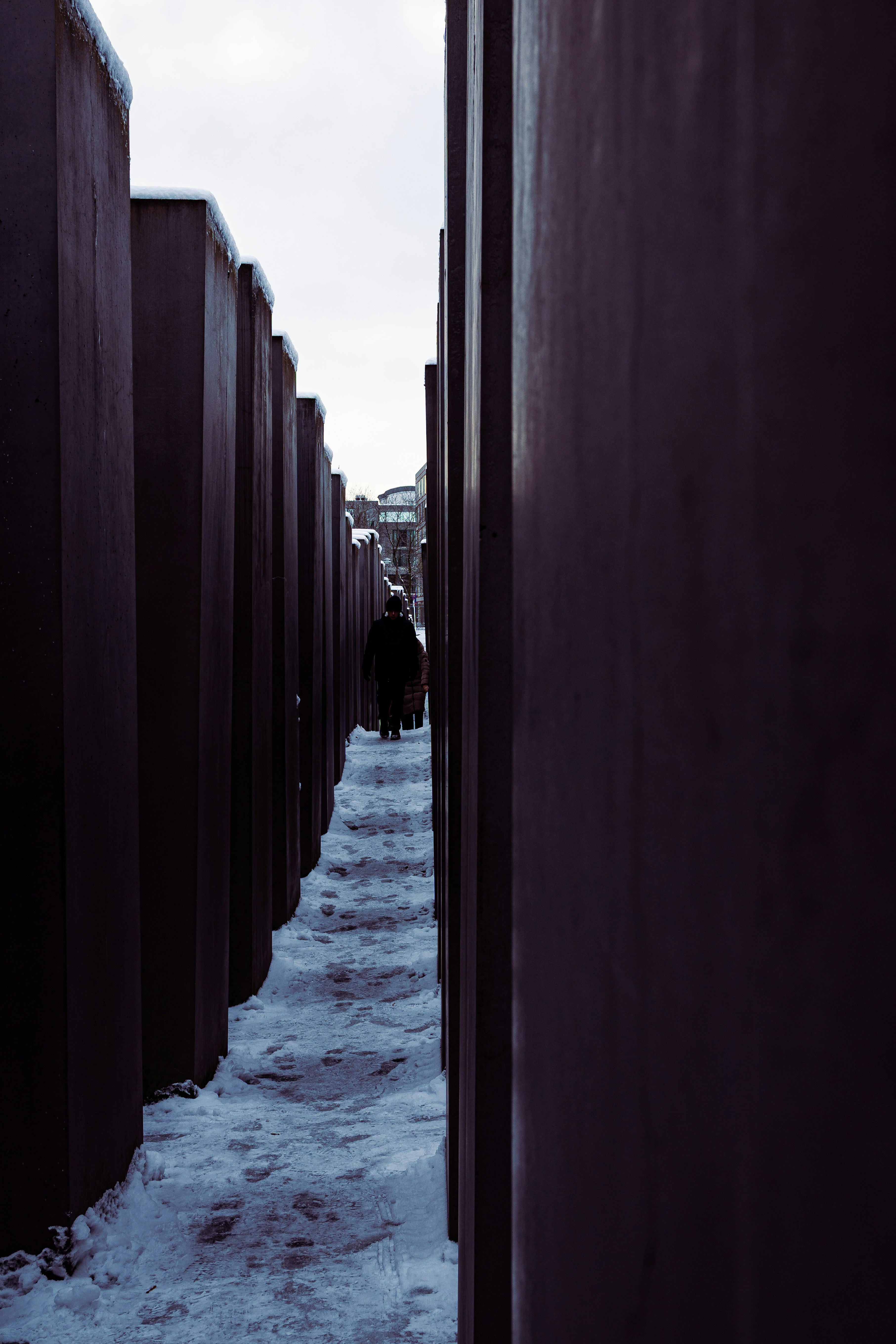 Echoes Through the Wall: A Narrow Snowbound Walk