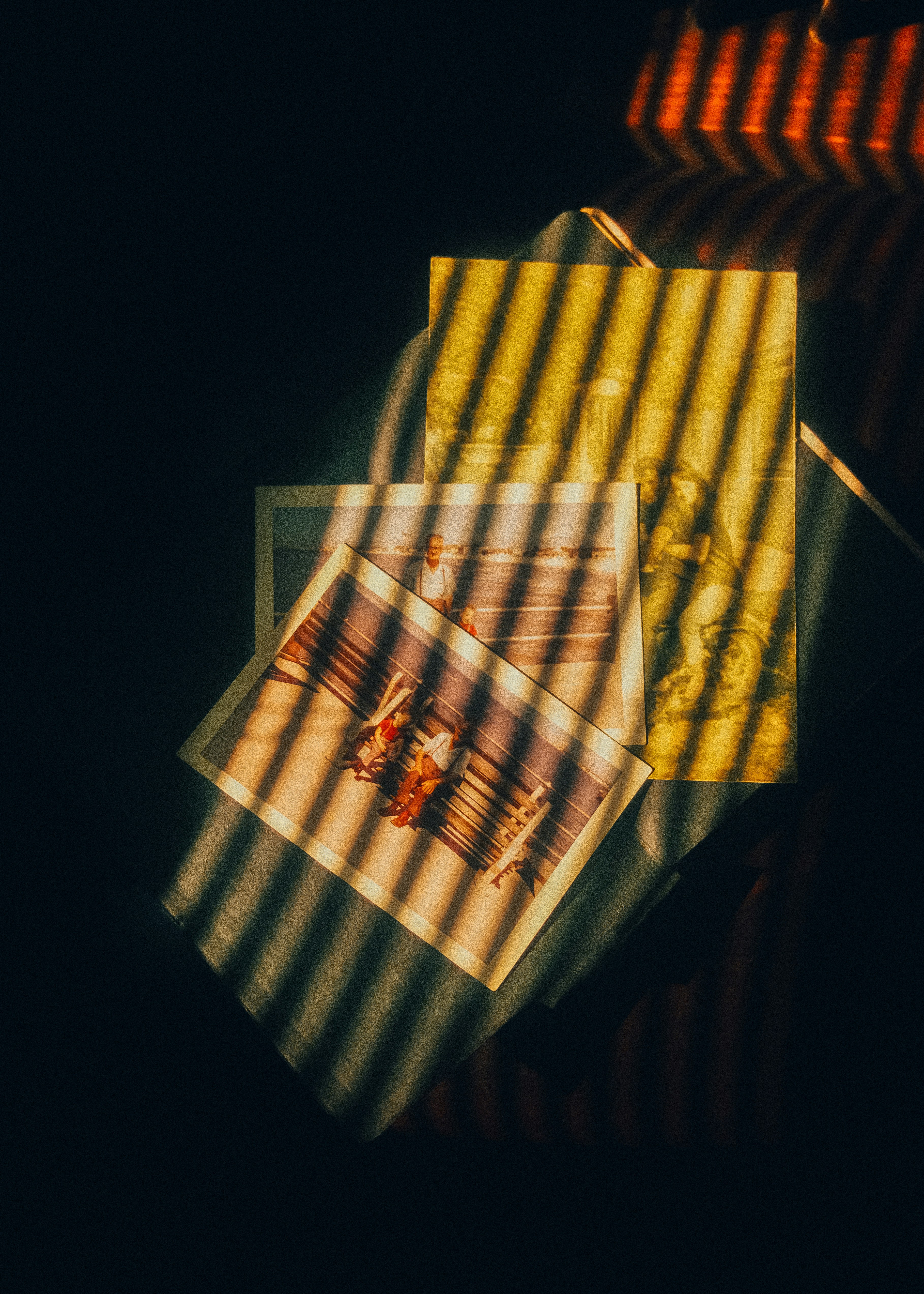 Shadowed Echoes: A Tilt of Memories from Overlapping Polaroids