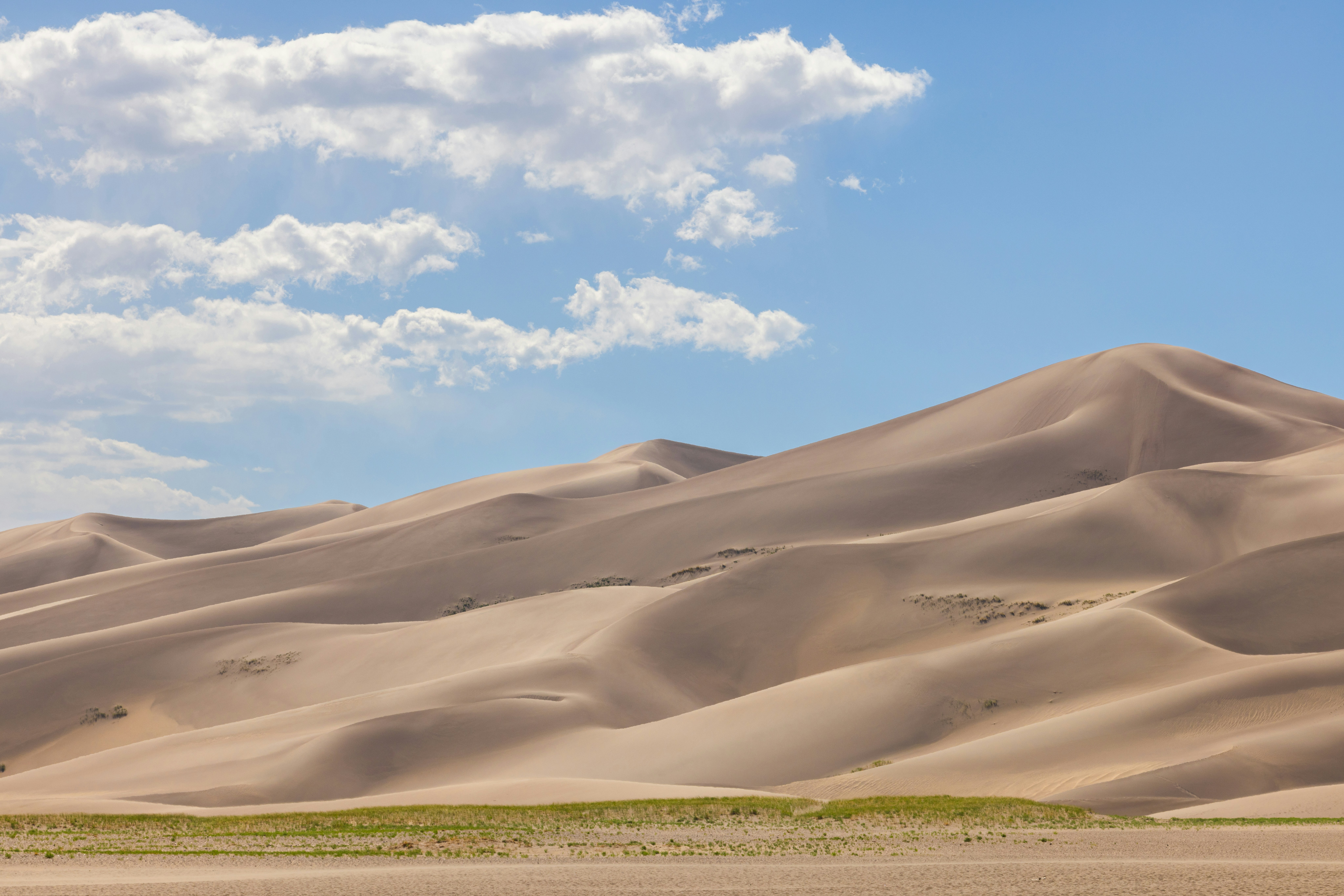 Golden Dunes under a Cerulean Sky