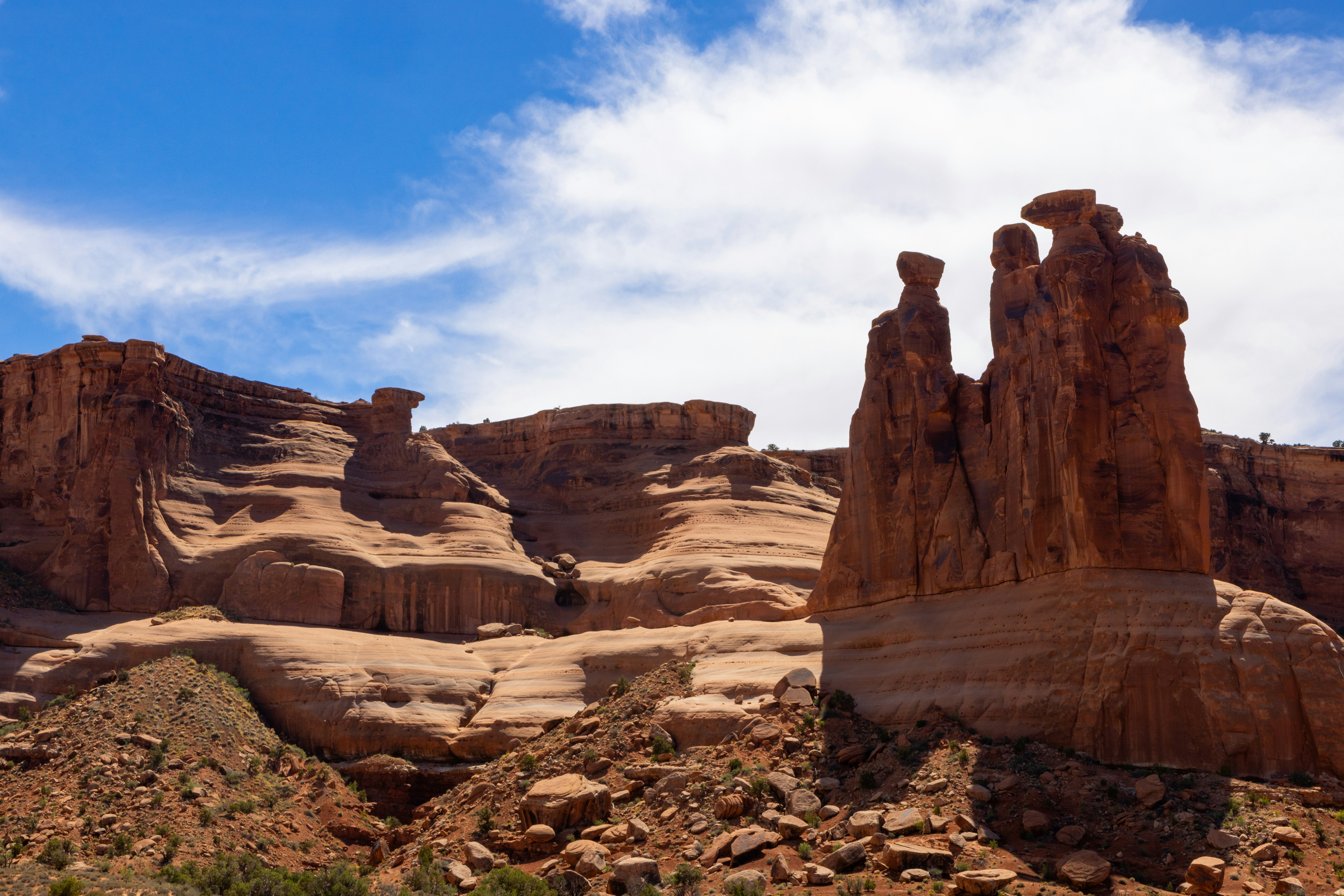 Desert Sentinel: Eroded Columns Beside the Moonlit Sky