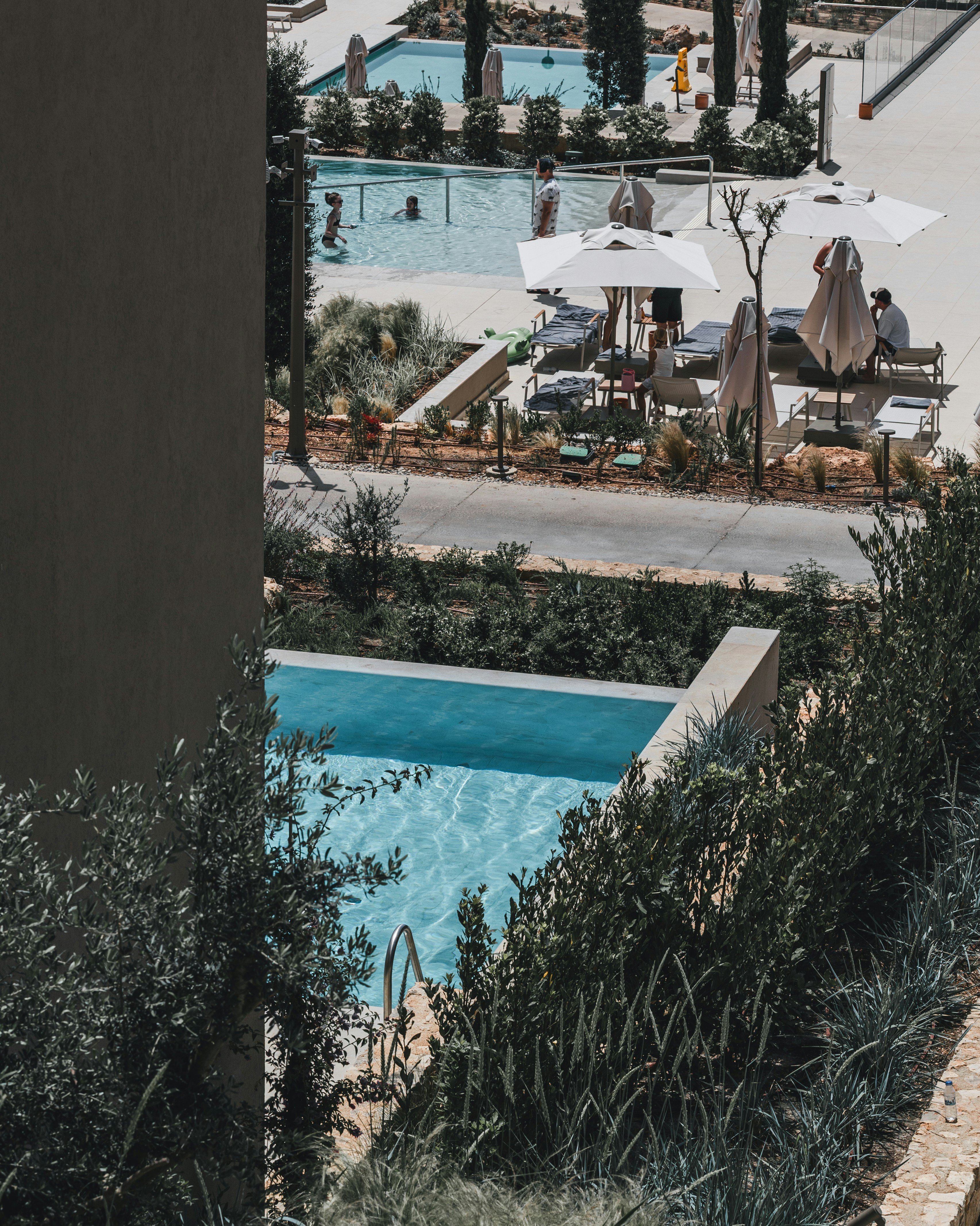 Poolside Oasis: Shadows, Tiles and Tepid Blues