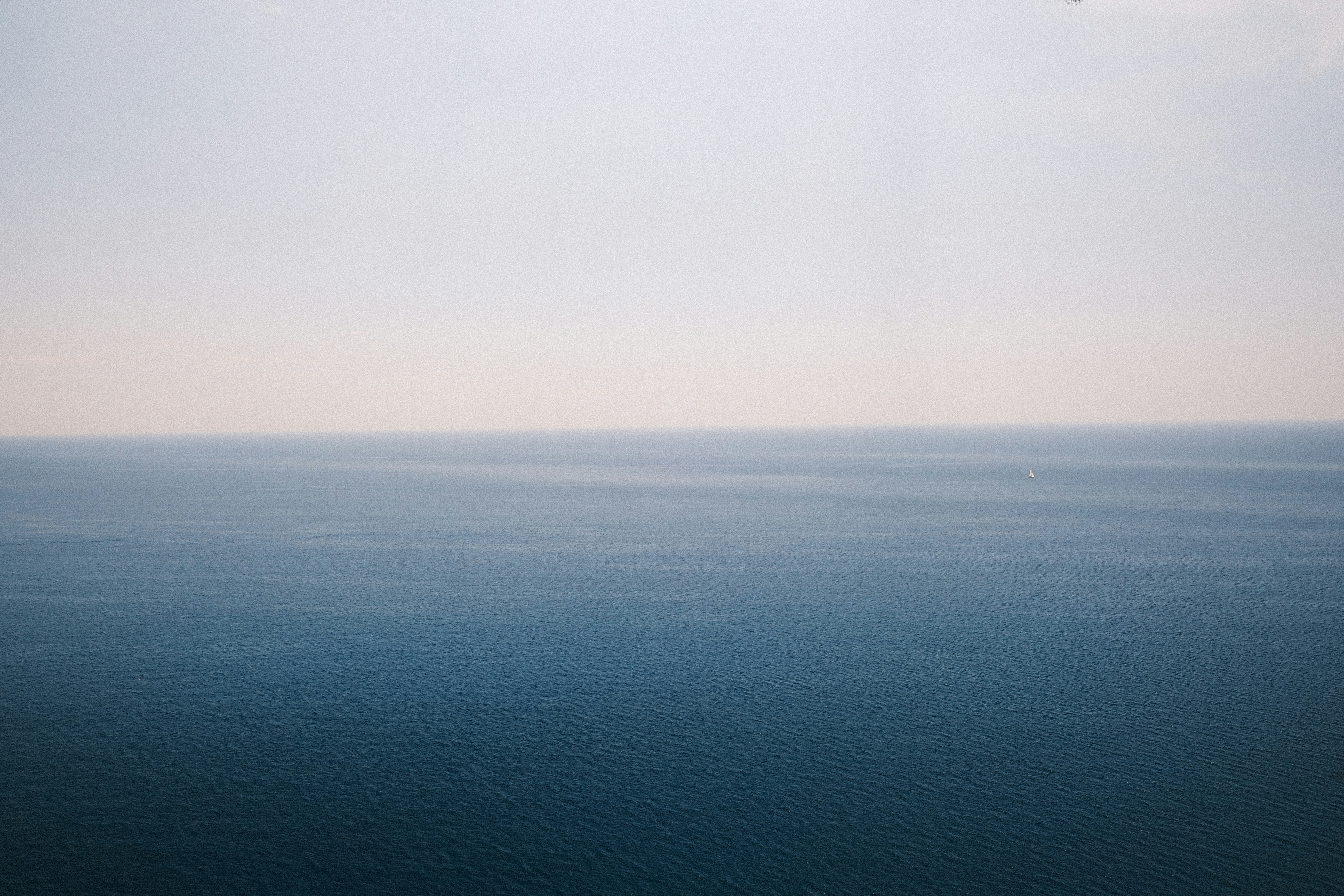 Horizon Whisper: A Calm Sea Between Sky and Depths
