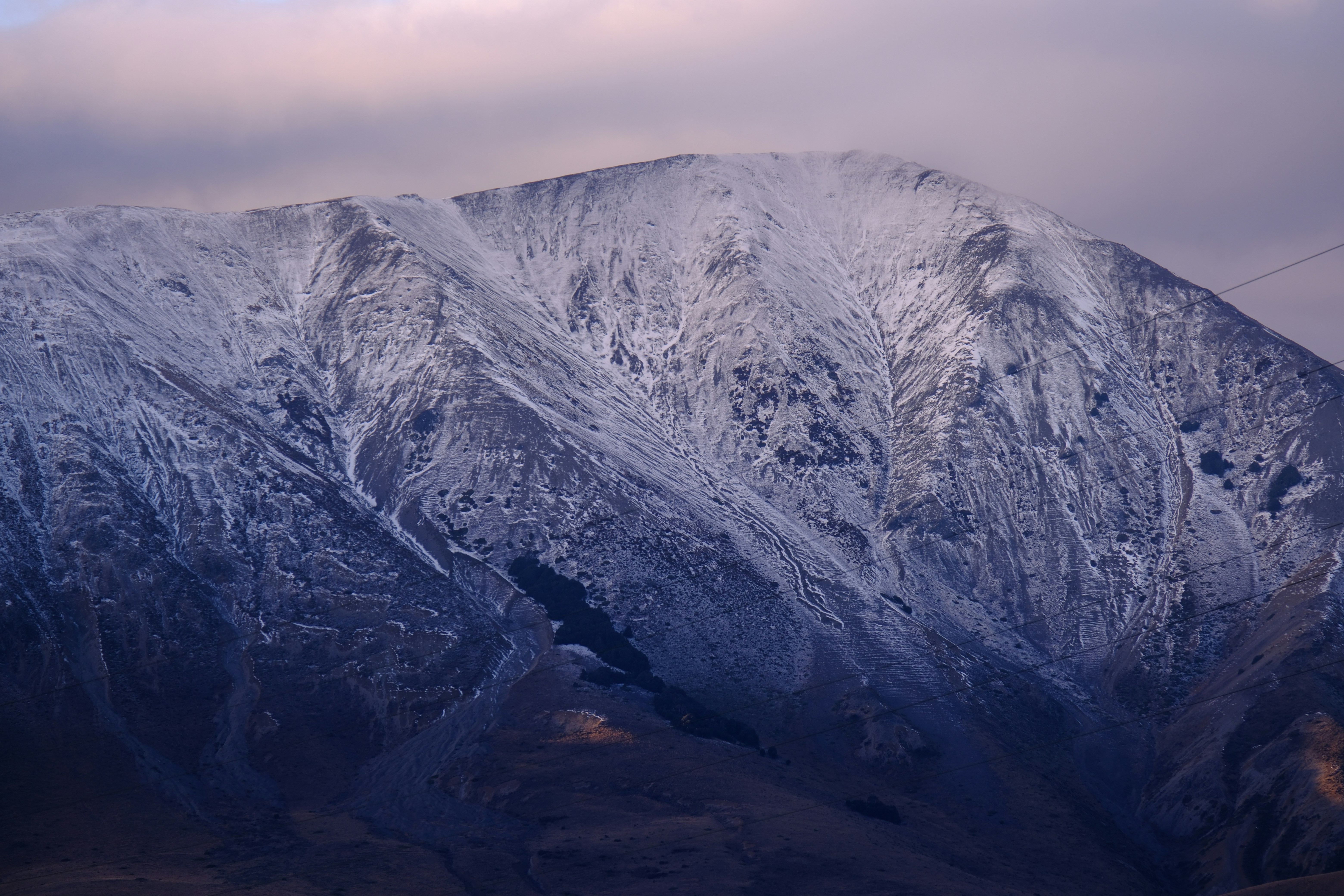 Snowbound Ridge Under Soft Evening Light