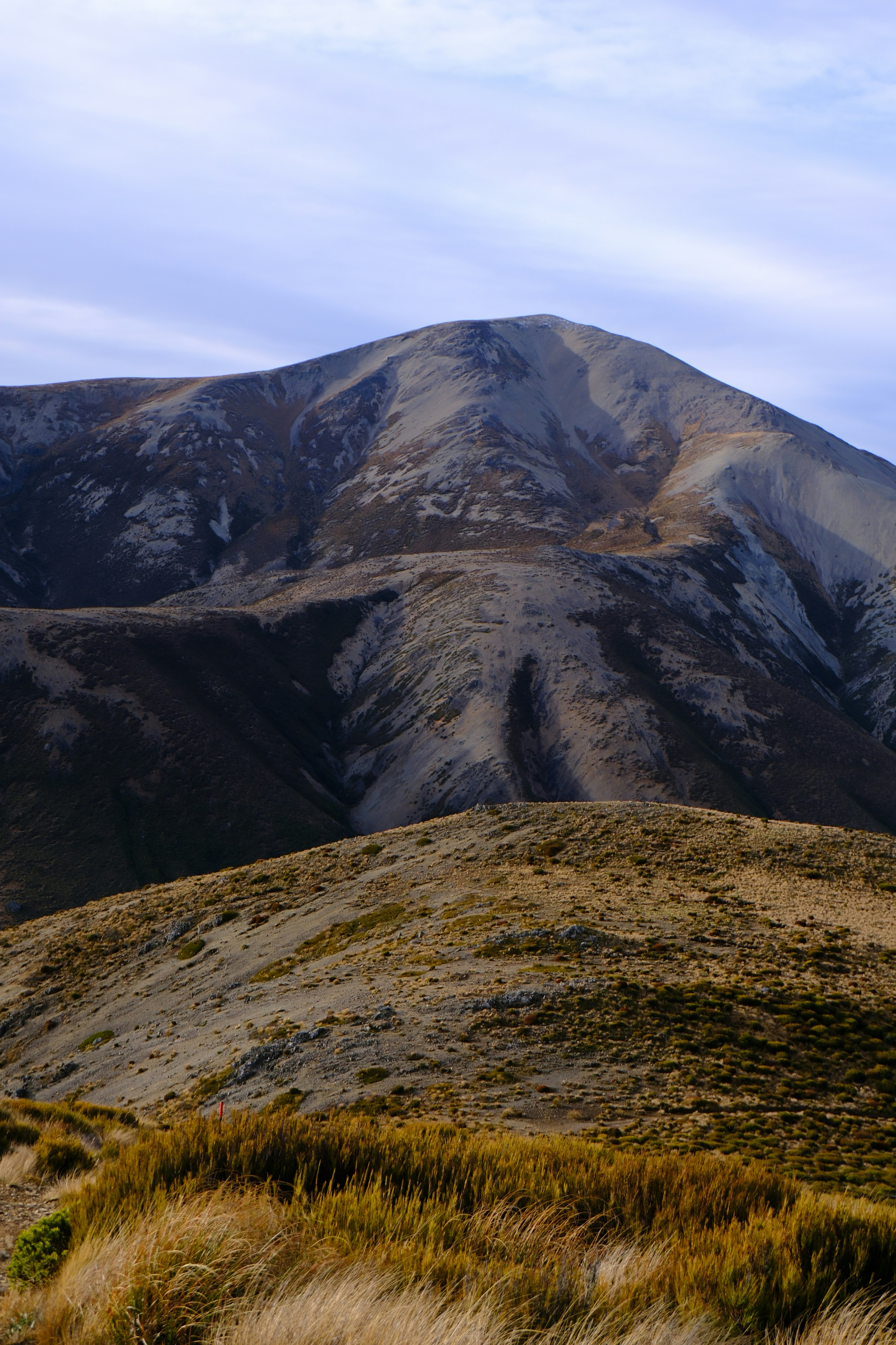 A Quiet Summit: Rugged Ridges Under a Wide Sky