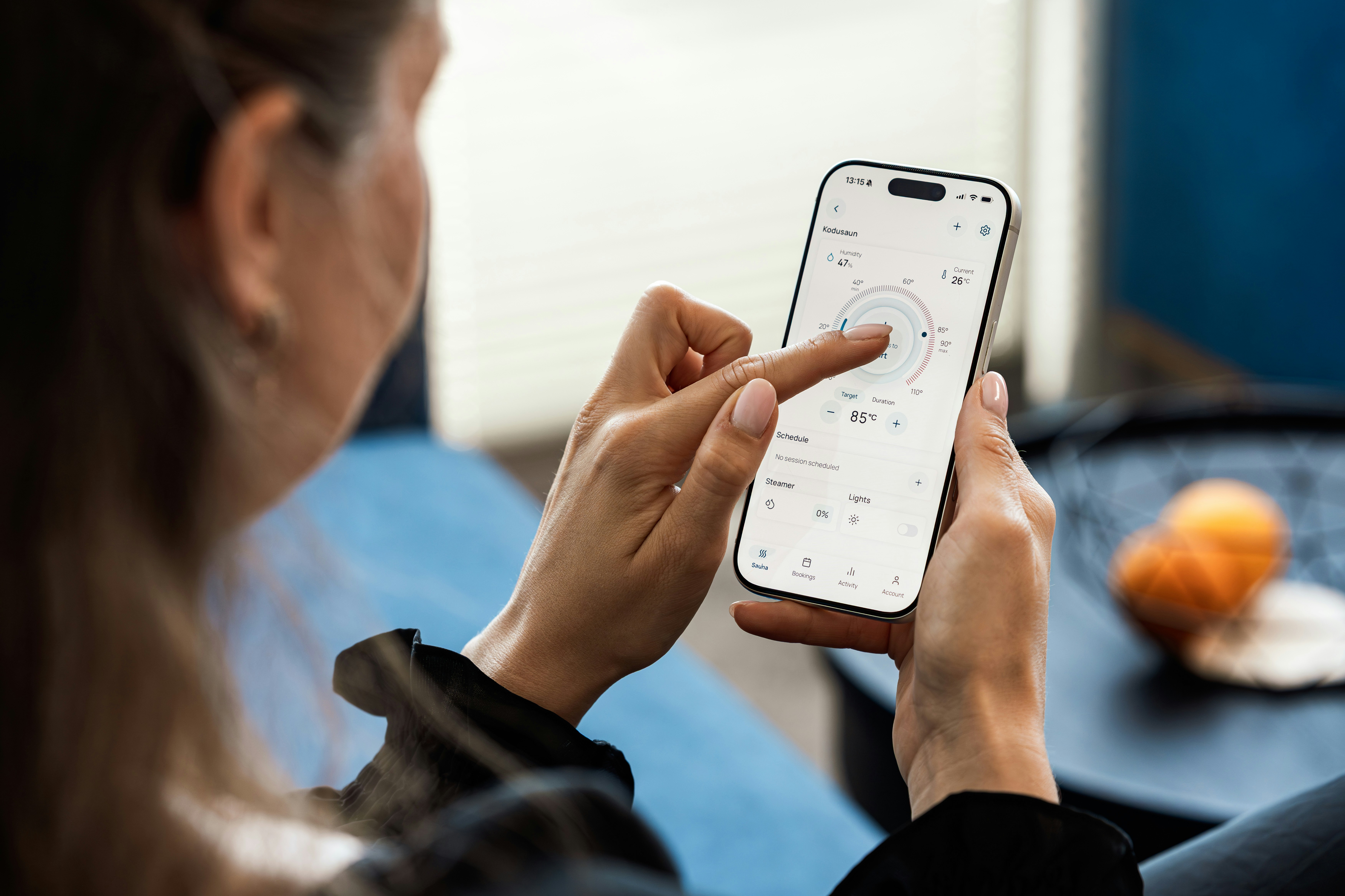 Touchscreen Focus: A Close-Up on Smartphone Interface in Hand
