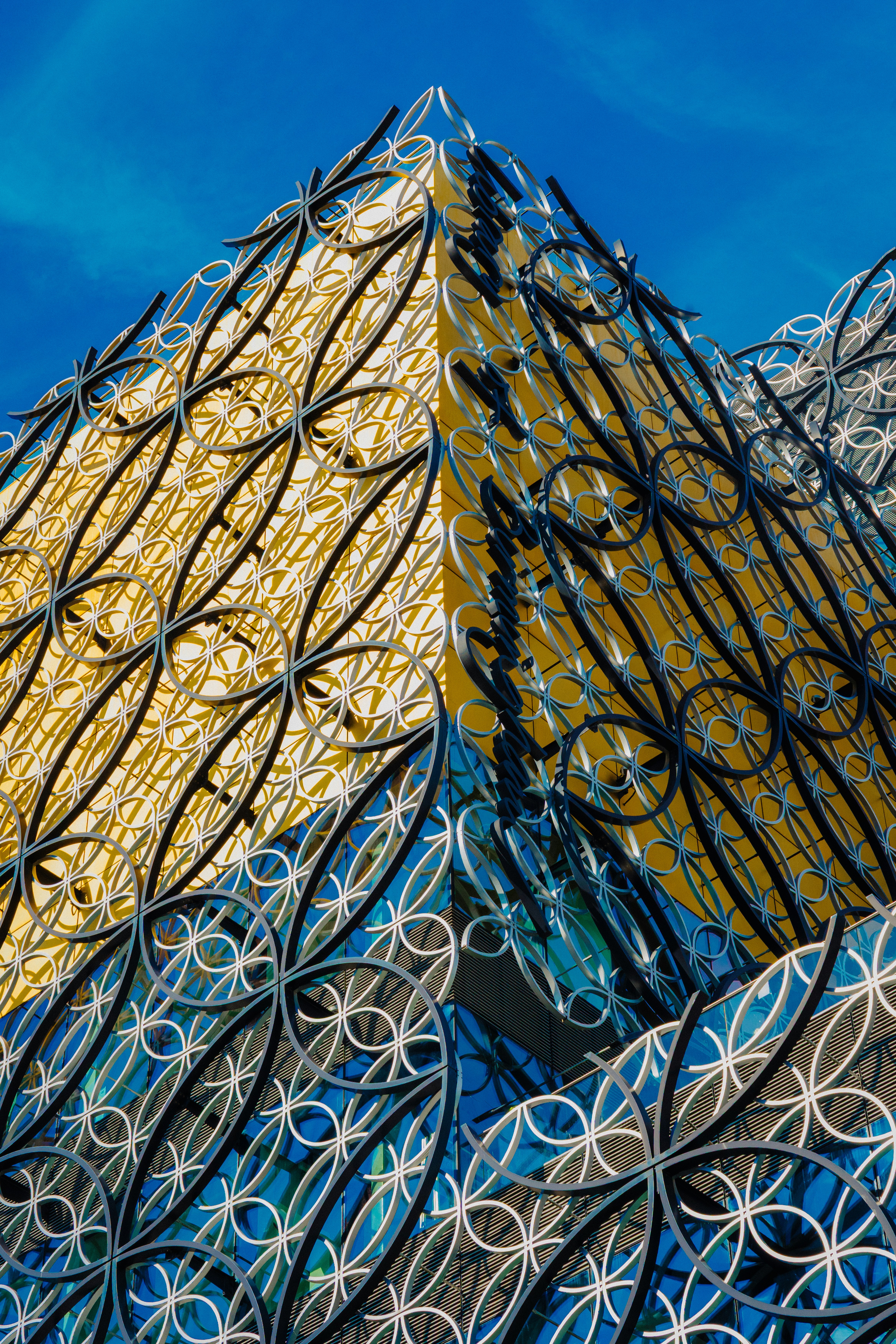 Lattice Diamond: Faceted Mesh Rising into a Clear Sky
