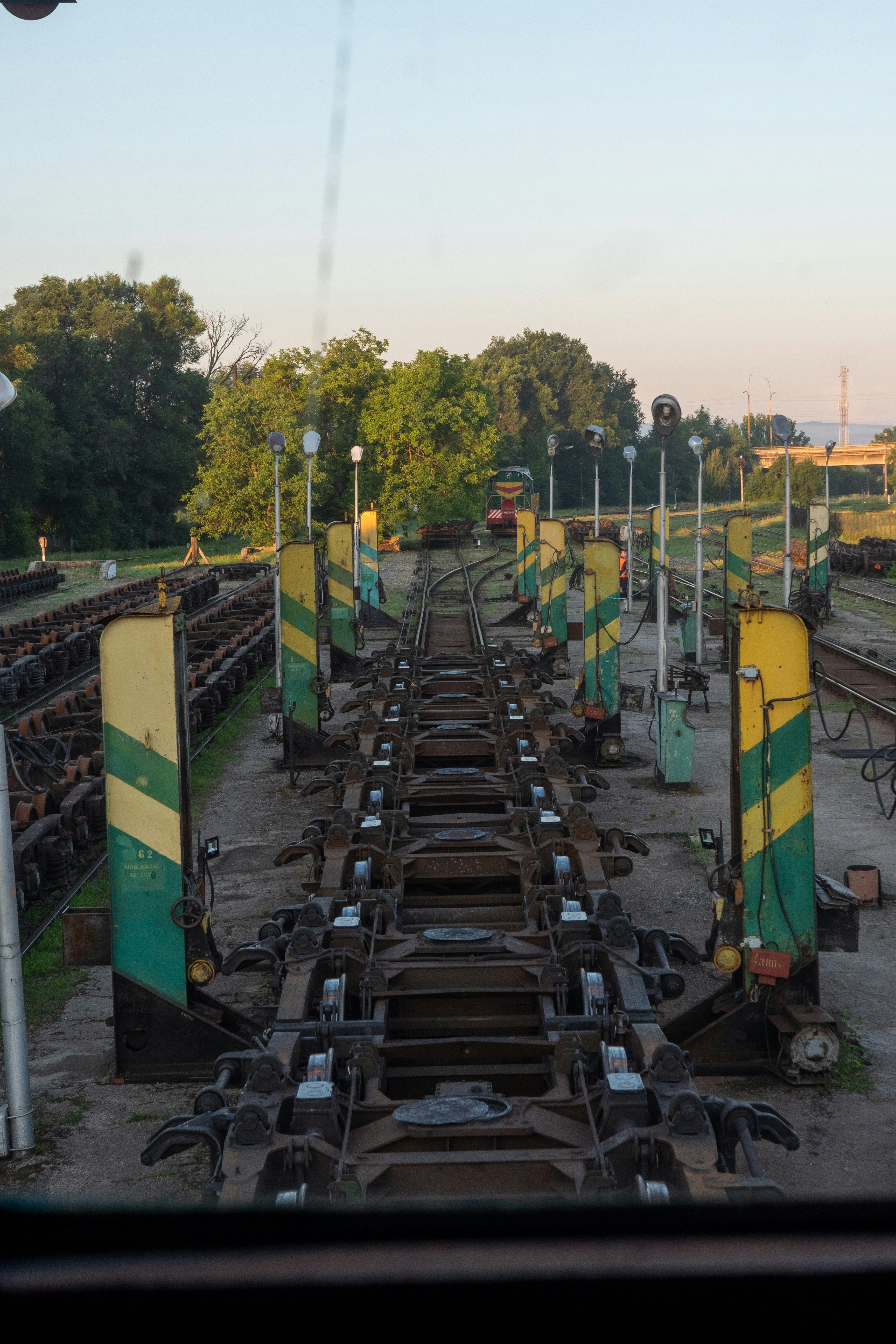Railway Yard Convergence: A Symmetry of Tracks and Signals