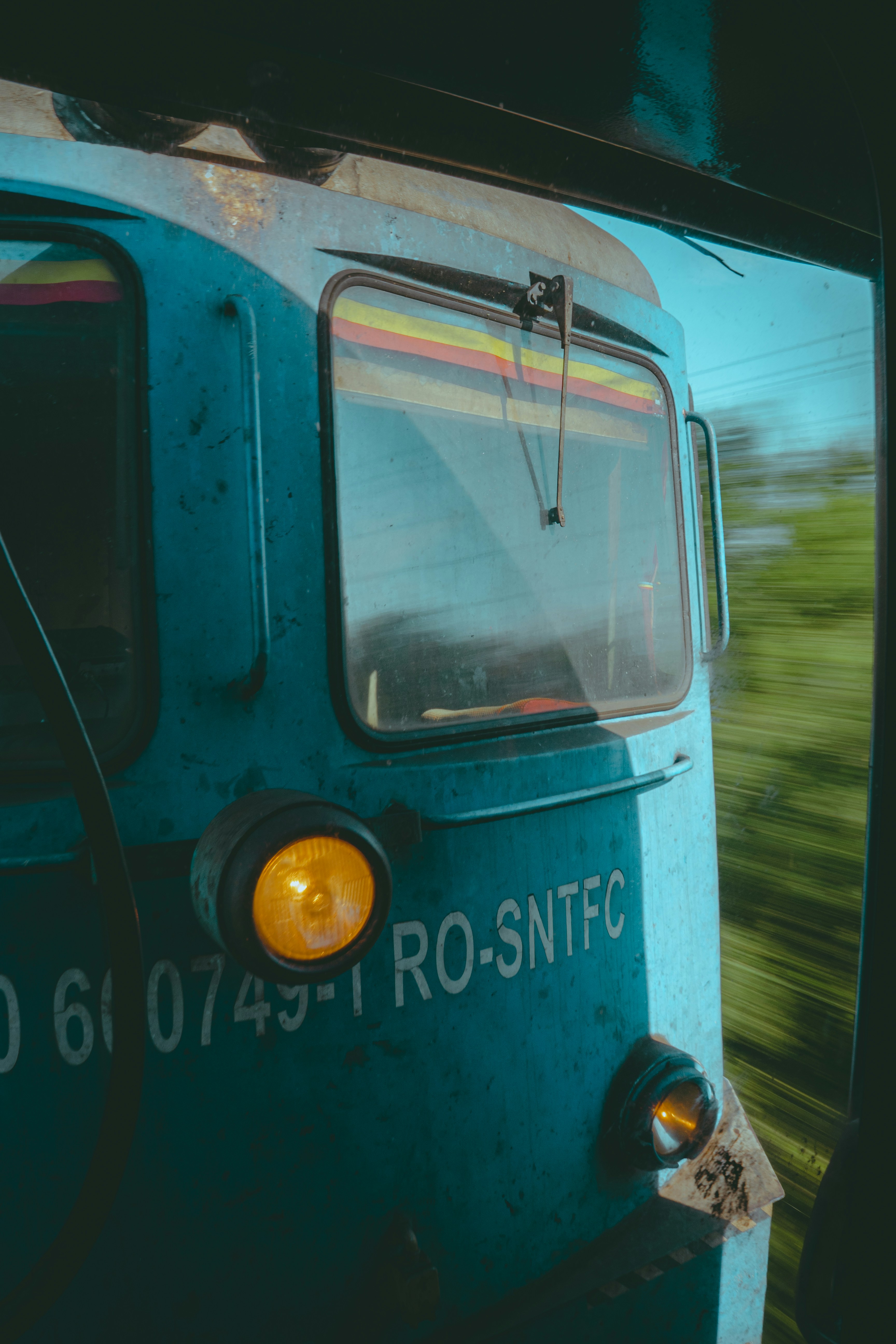 Blue Conductor: A Window into a Worn Bus Front