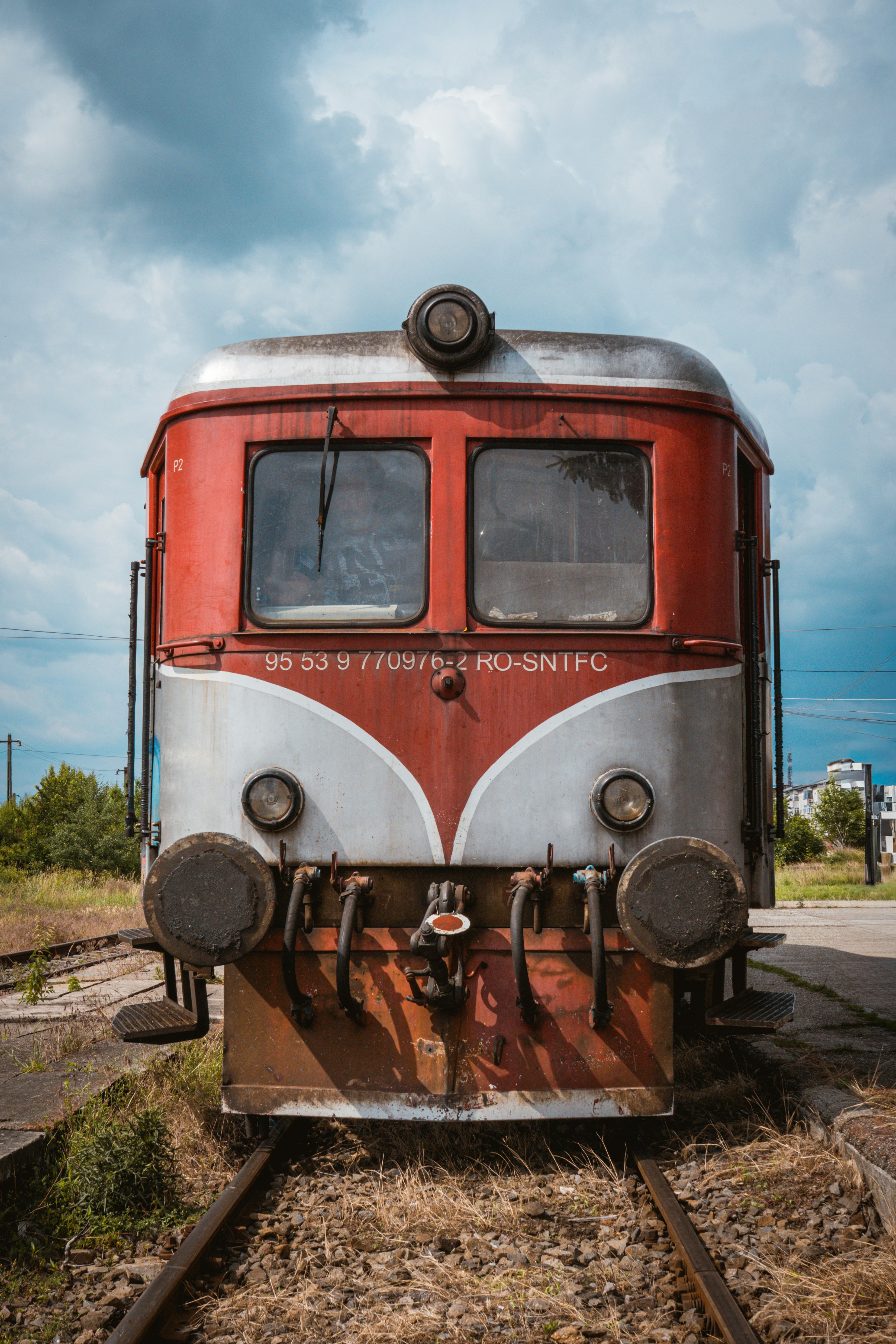 Front Nose of a Weathered Red Diesel Shunter Peering Down the Rails