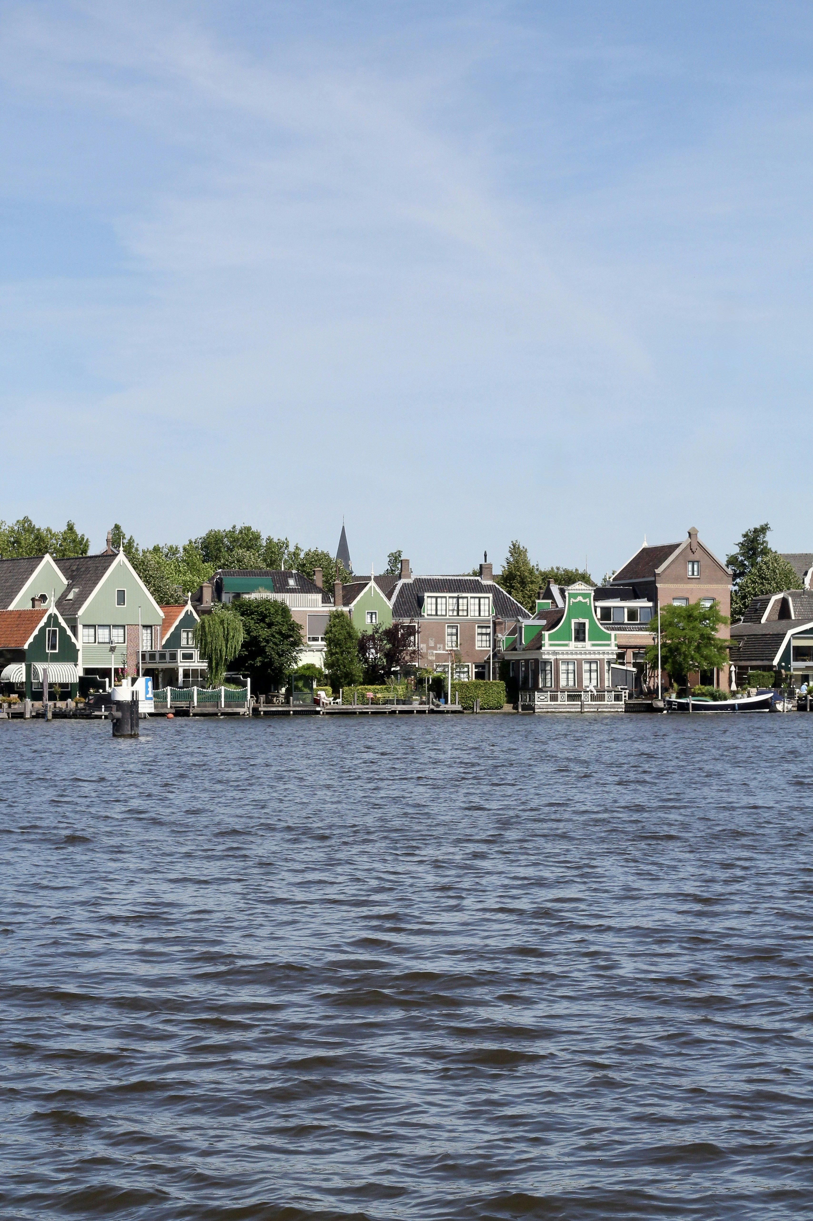Waterfront of Dutch-Style Row Houses Reflecting in the Harbour