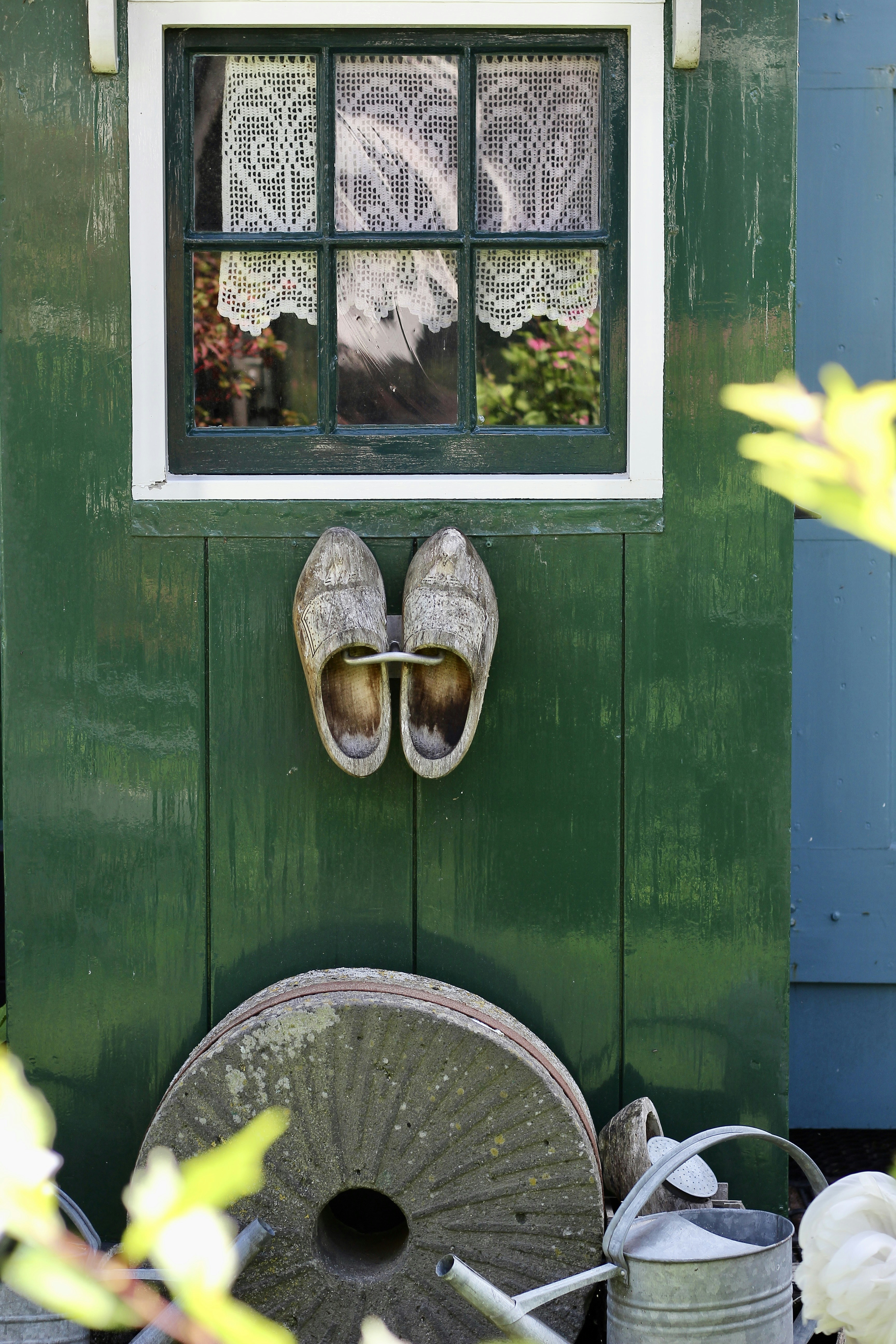 Boots on the Green Door: A Quiet Wardrobe Scene