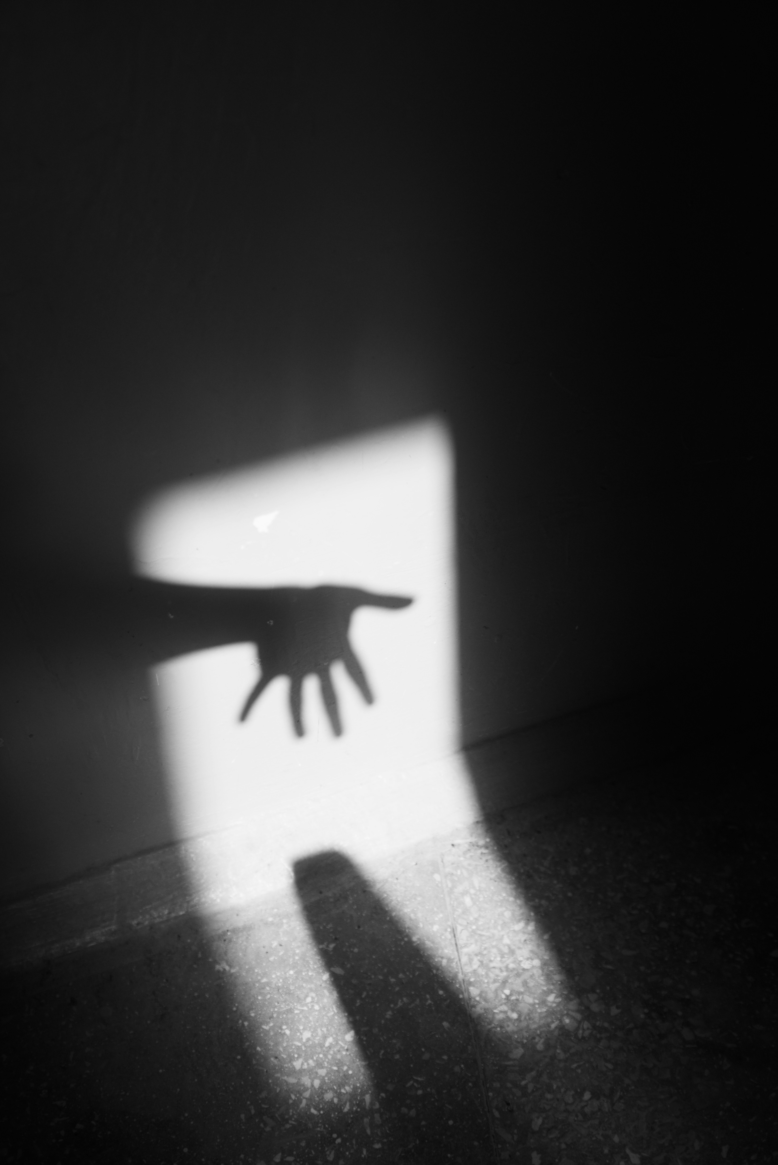 Shadow Leap: An Outstretched Hand in a Narrow Light