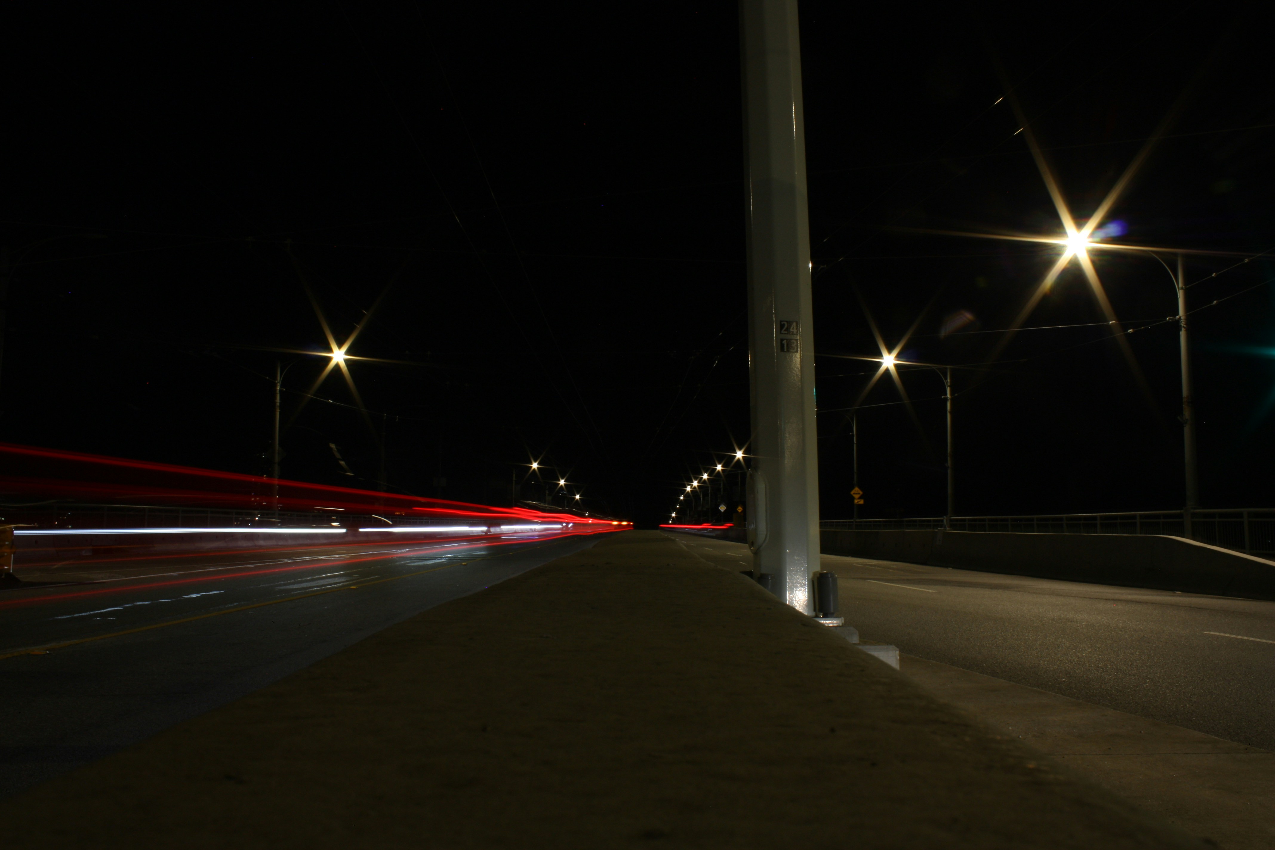Midnight Bridge: Light Trails on a Quiet Crossing