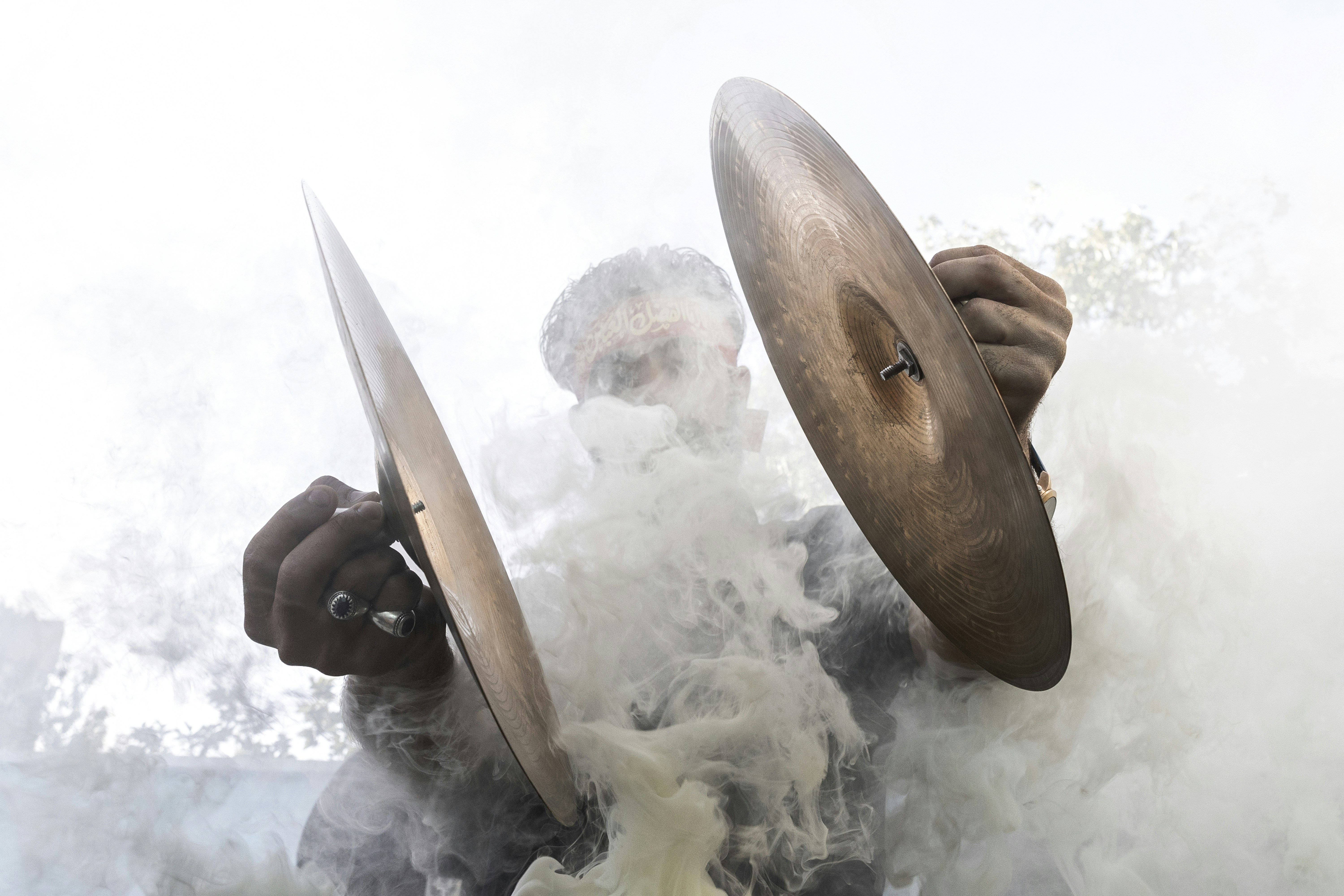 Cymbals of Smoke: A Duel in the Clouded Arena