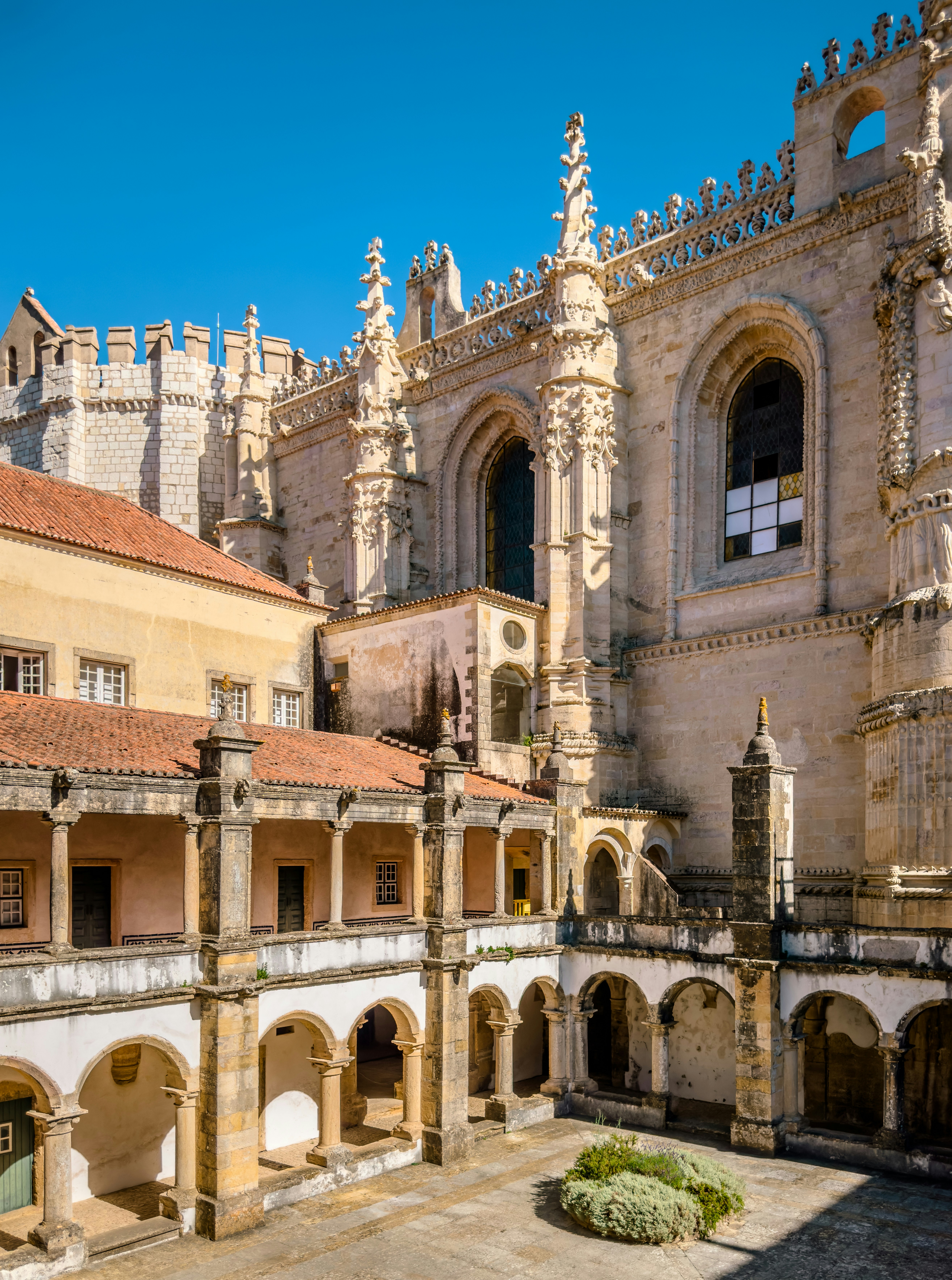 Courtyard of Carved Grandeur: A Gothic-Influenced Monastic Complex