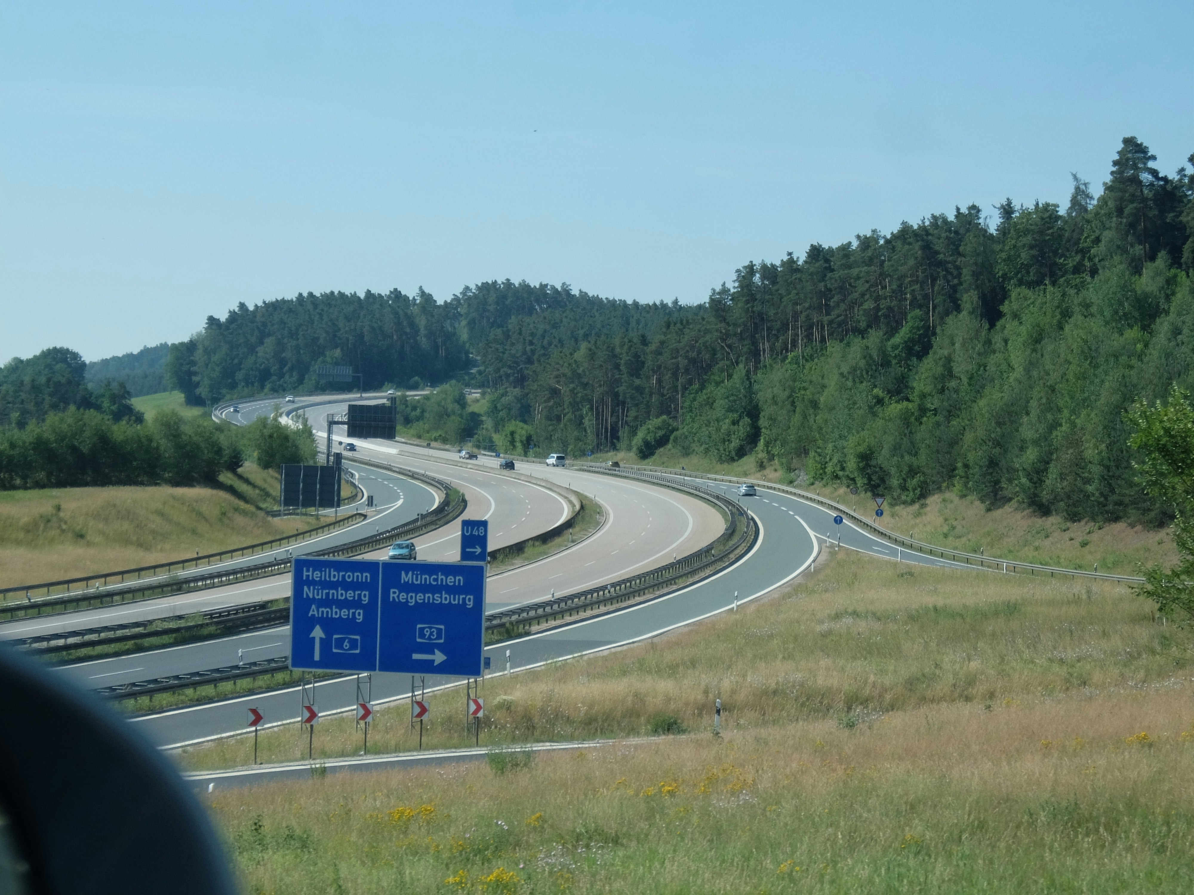 Highway Cascade: A Quiet Bend Through Verdant Countryside
