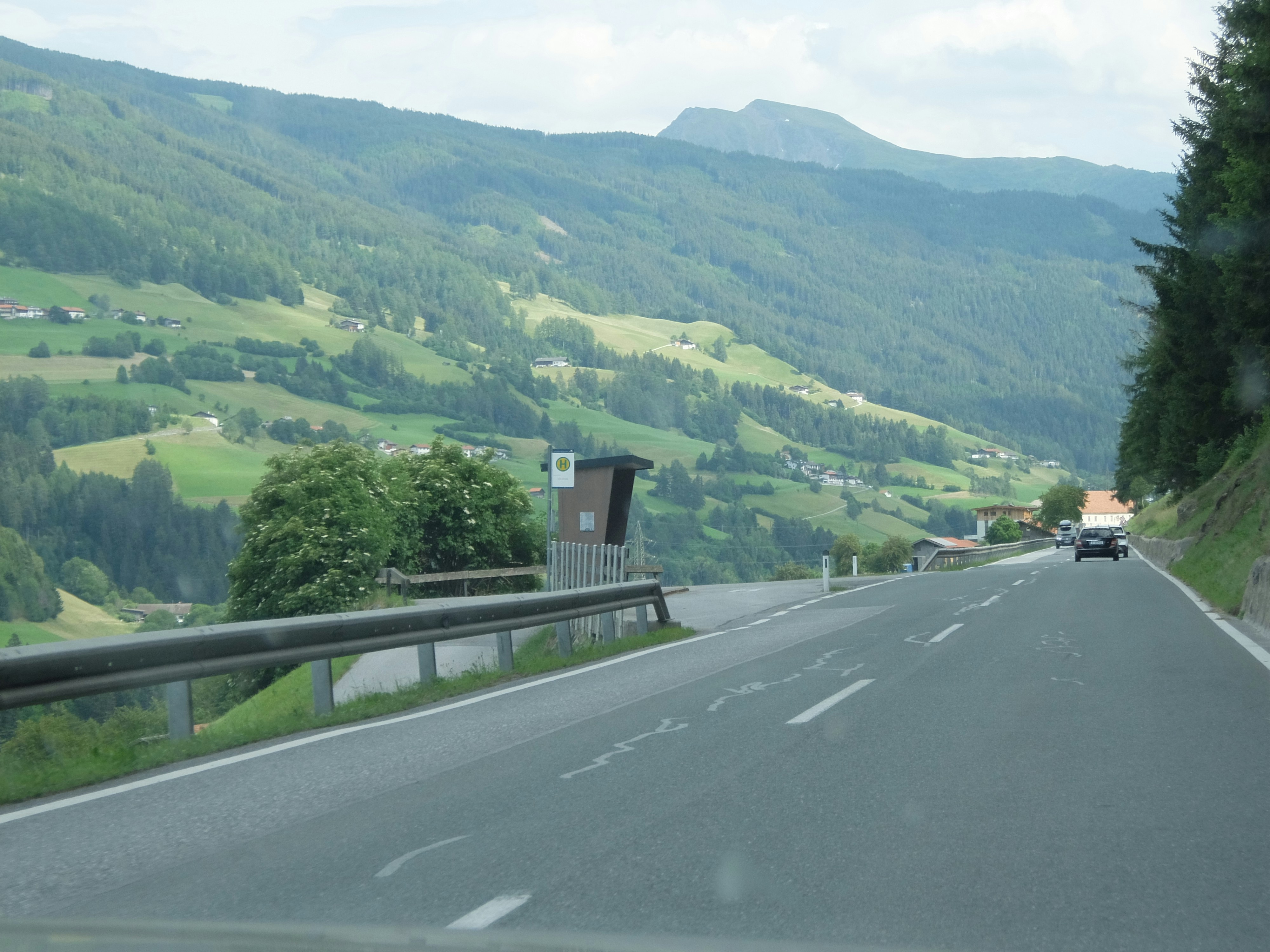 Ride Over the Green Ridge: A Serene Mountain Pass