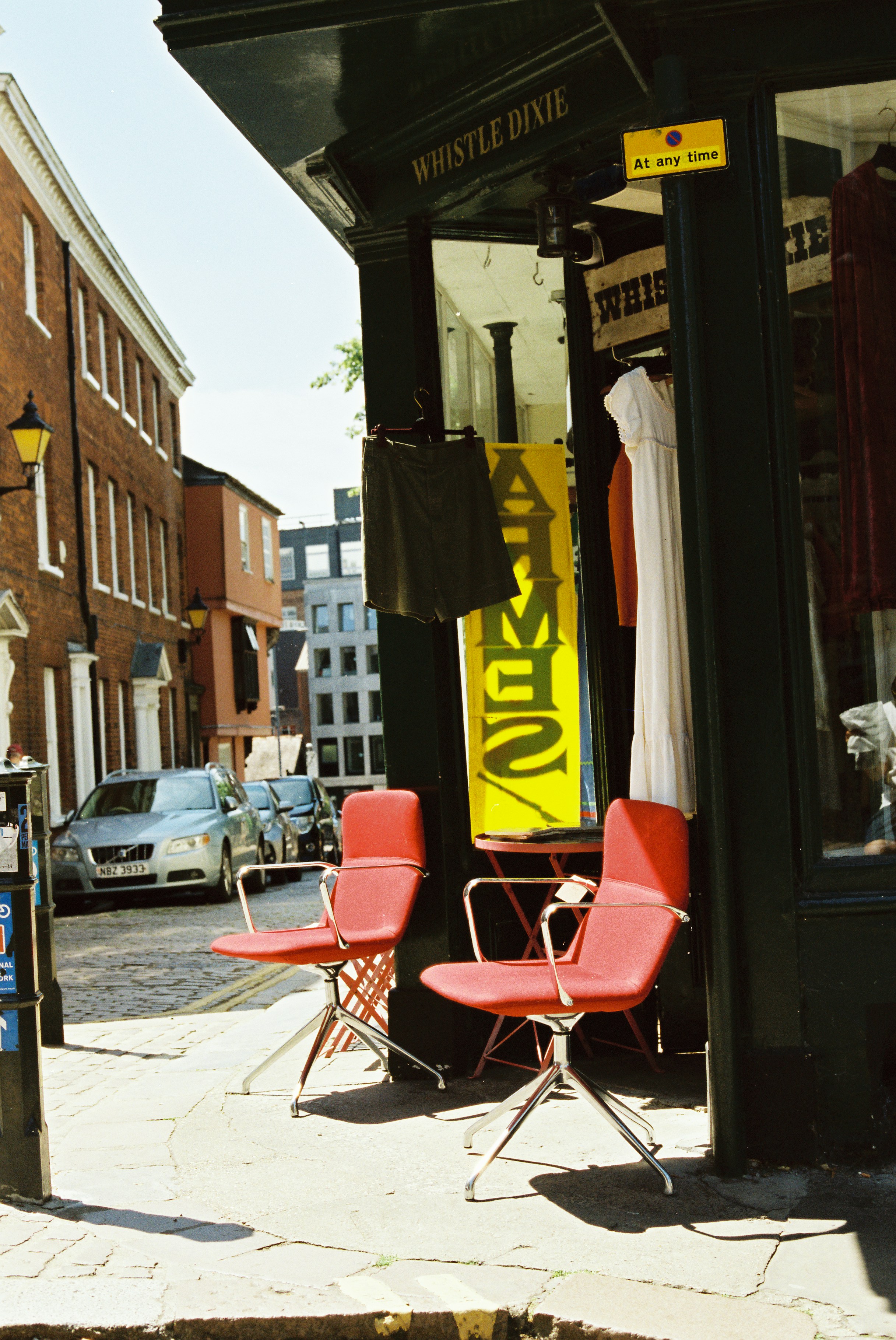 Sidewalk café Chairs in a Quiet Street Frame