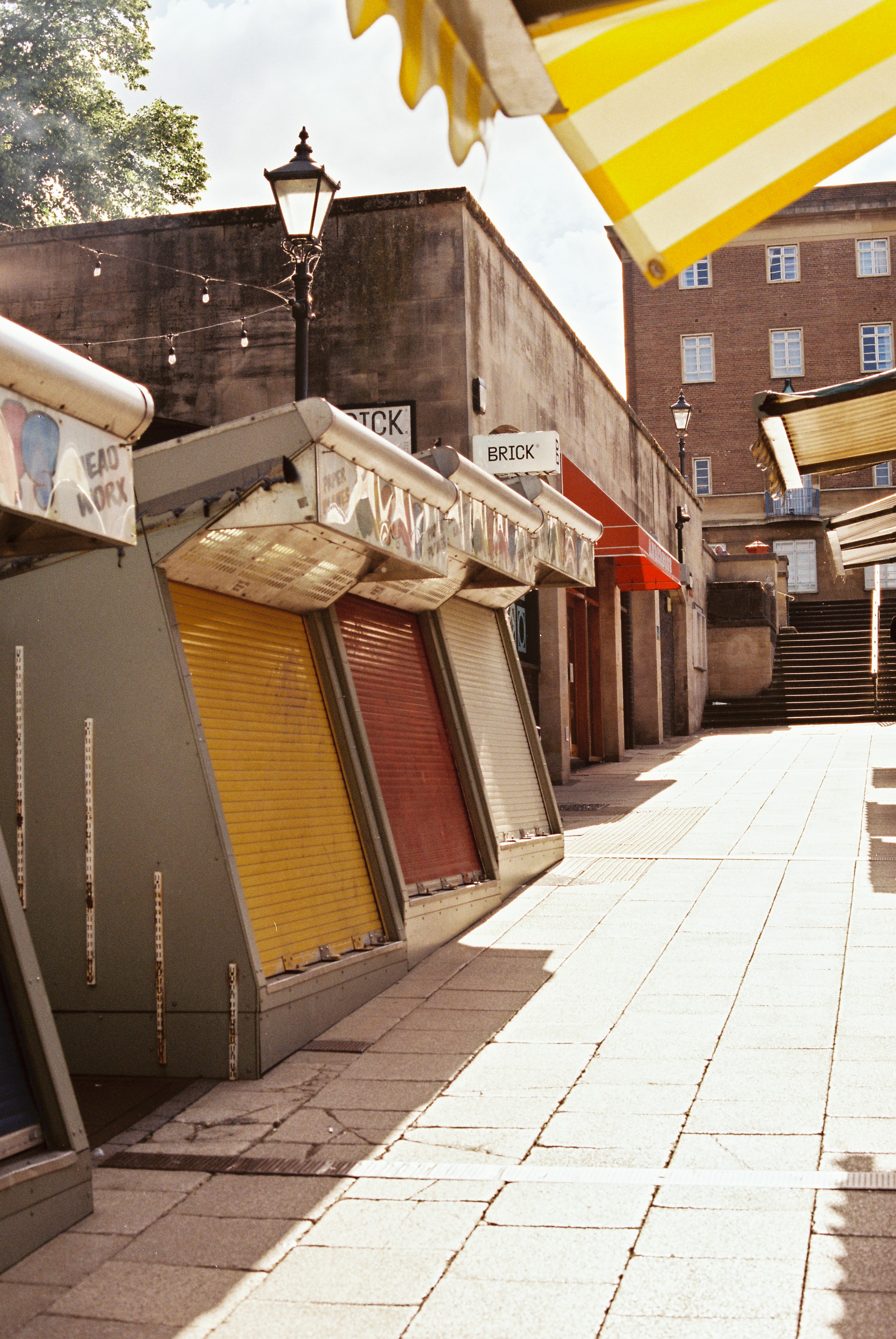 Stalled Stalls and Sunlit Alleyway