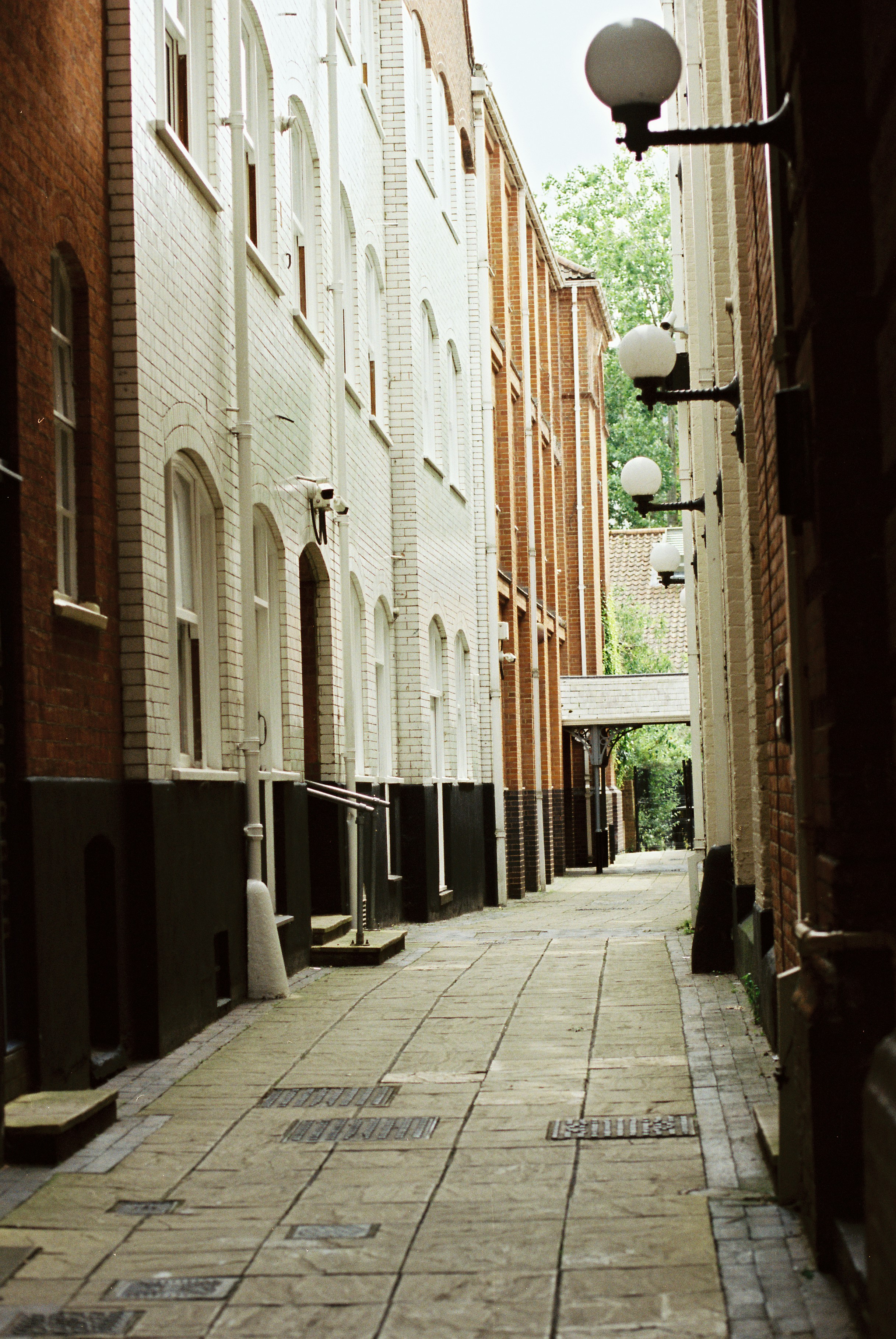 Between Brick Girders: Quiet Alleyway to the Courtyard