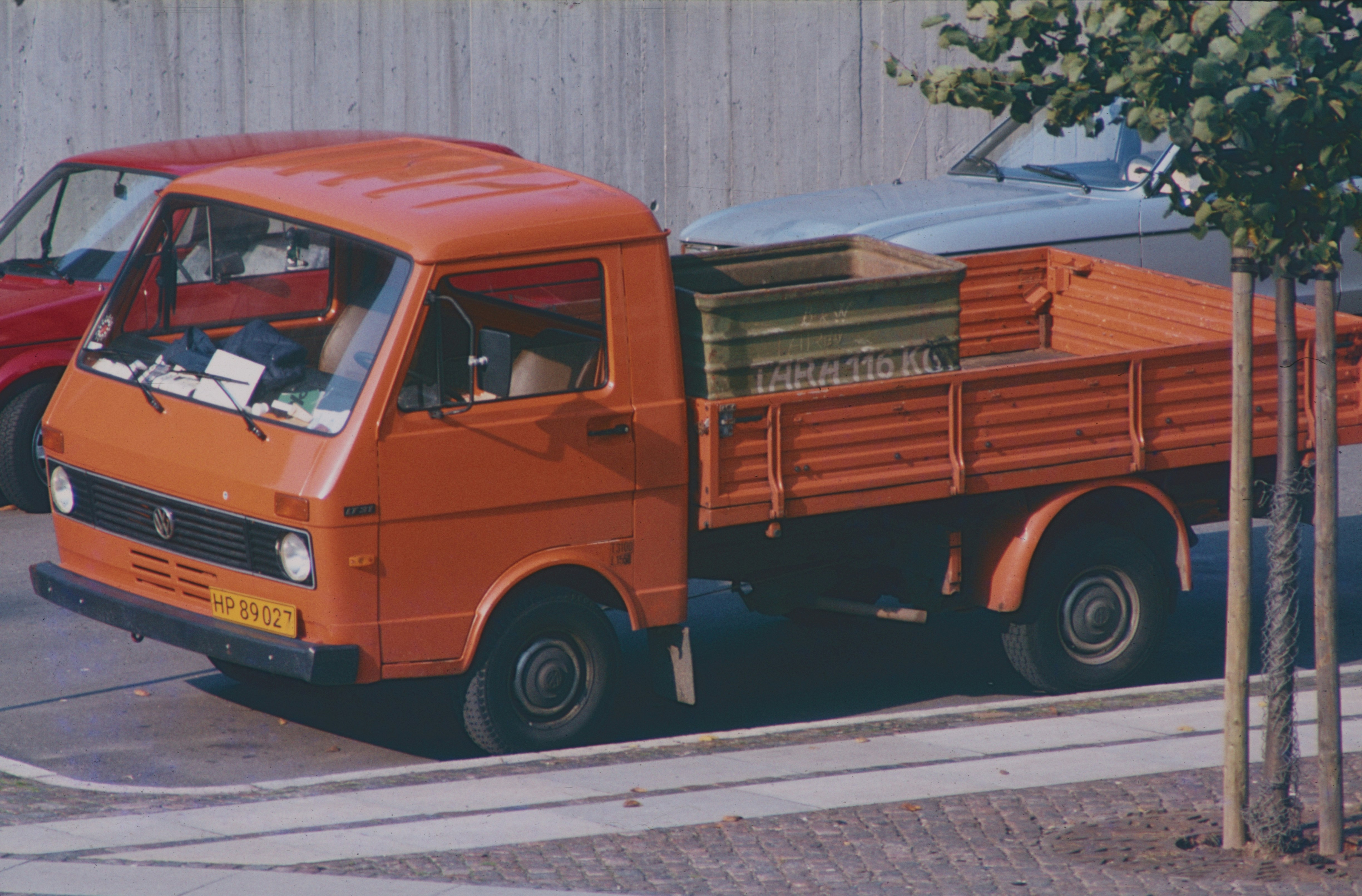 Orange Hauler in a Quiet Lot